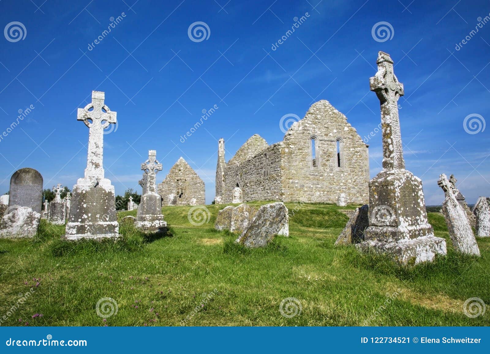 Clonmacnoise Cathedral with the Typical Crosses and Graves Stock Image ...