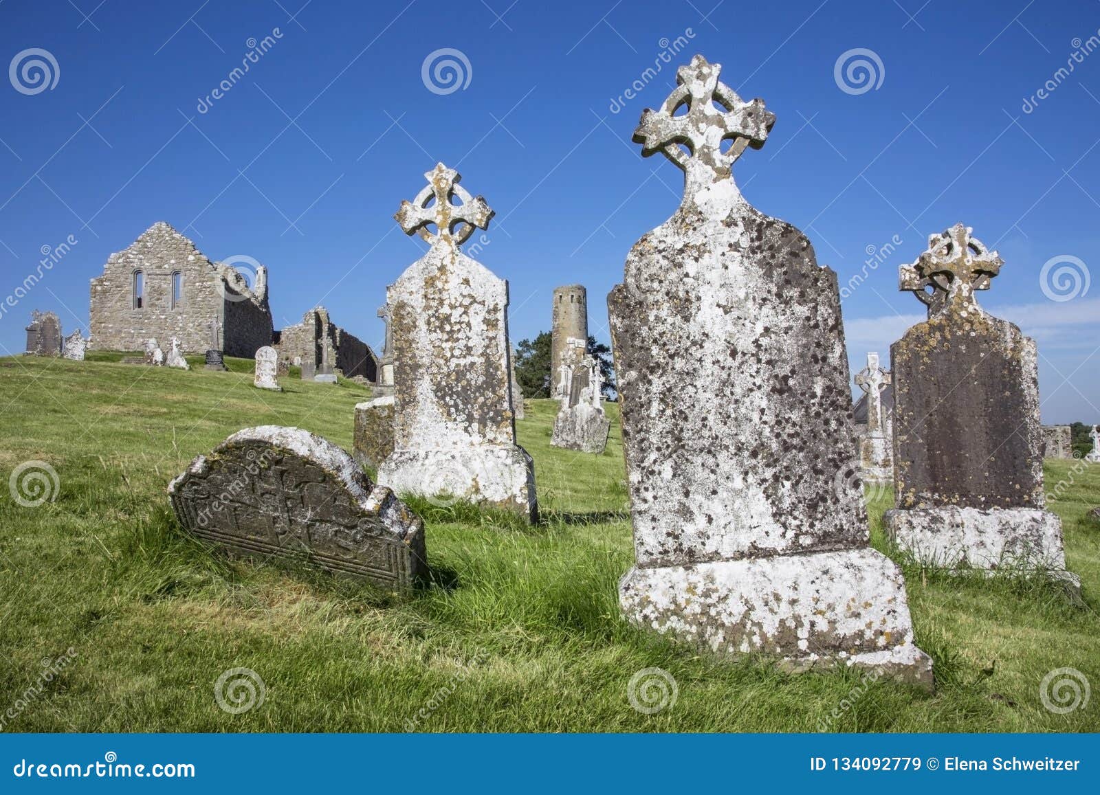 Clonmacnoise Cathedral with the Typical Crosses and Graves Stock Image ...