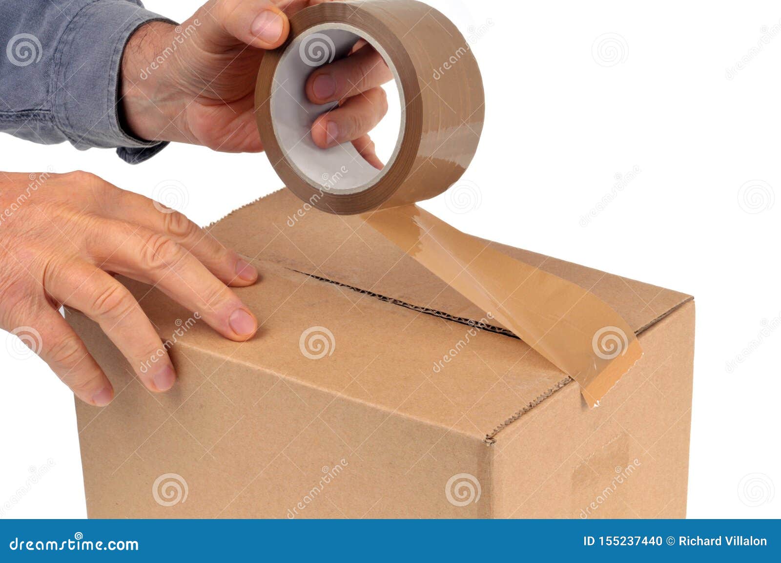 Close a Cardboard Box with an Adhesive Roll Stock Photo - Image of ...