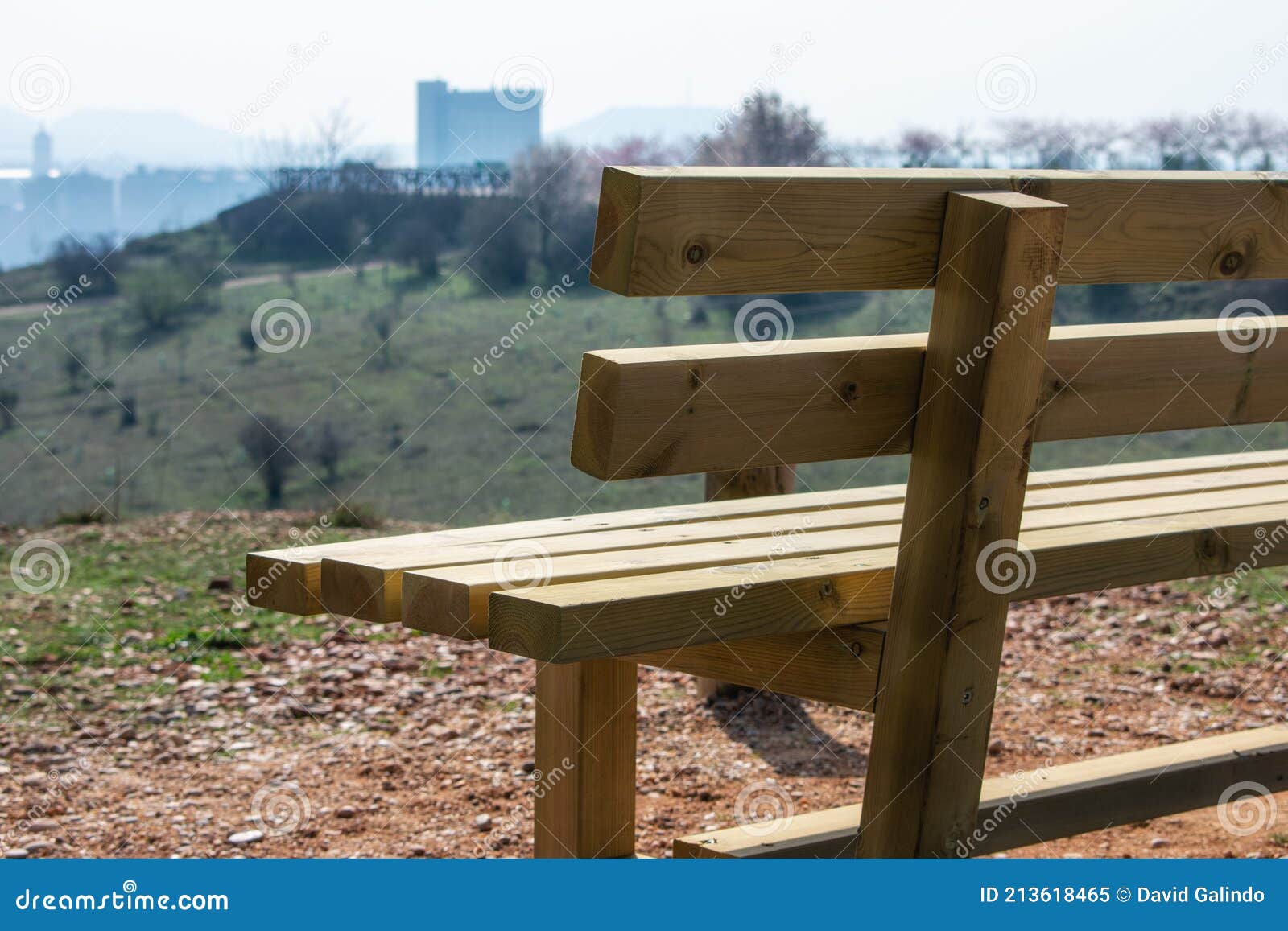 Close Empty Wooden Bench in Spring Park Over the City Stock Image ...