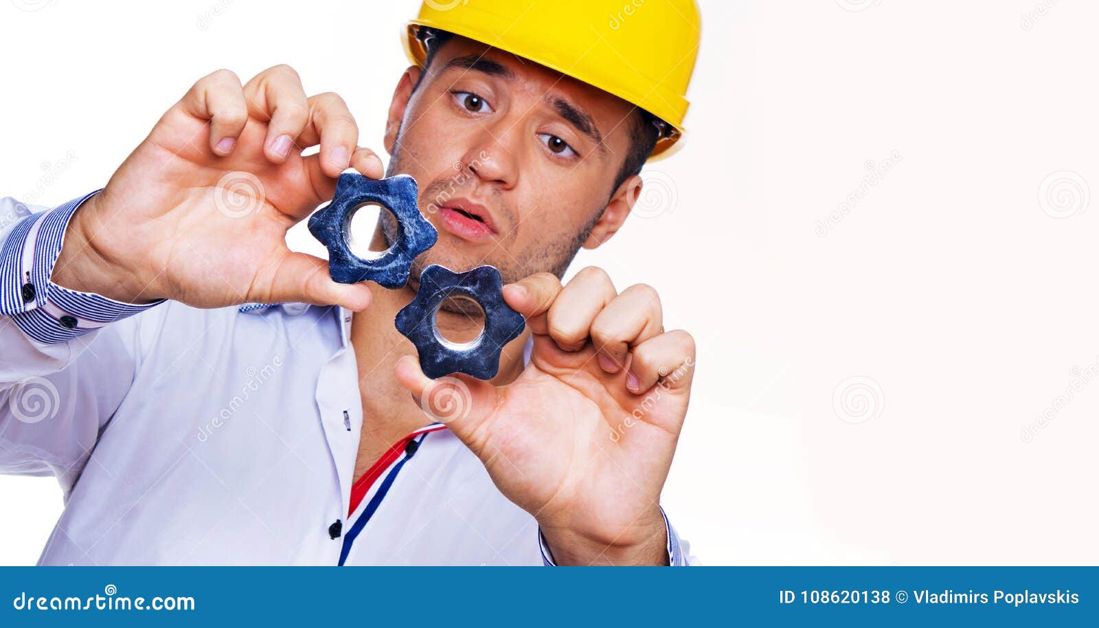 Close Portrait of Handsome Engineer Posing in Studio with Metal Stock ...