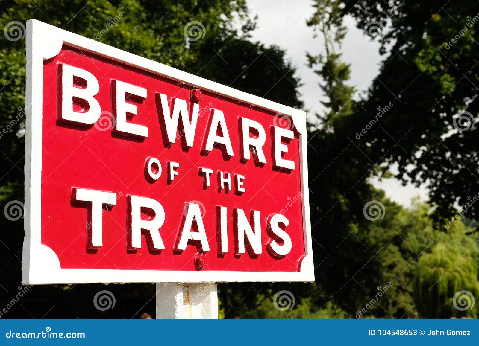 Close Up of Railway Sign Reading BEWARE of the TRAINS. Stock Image ...