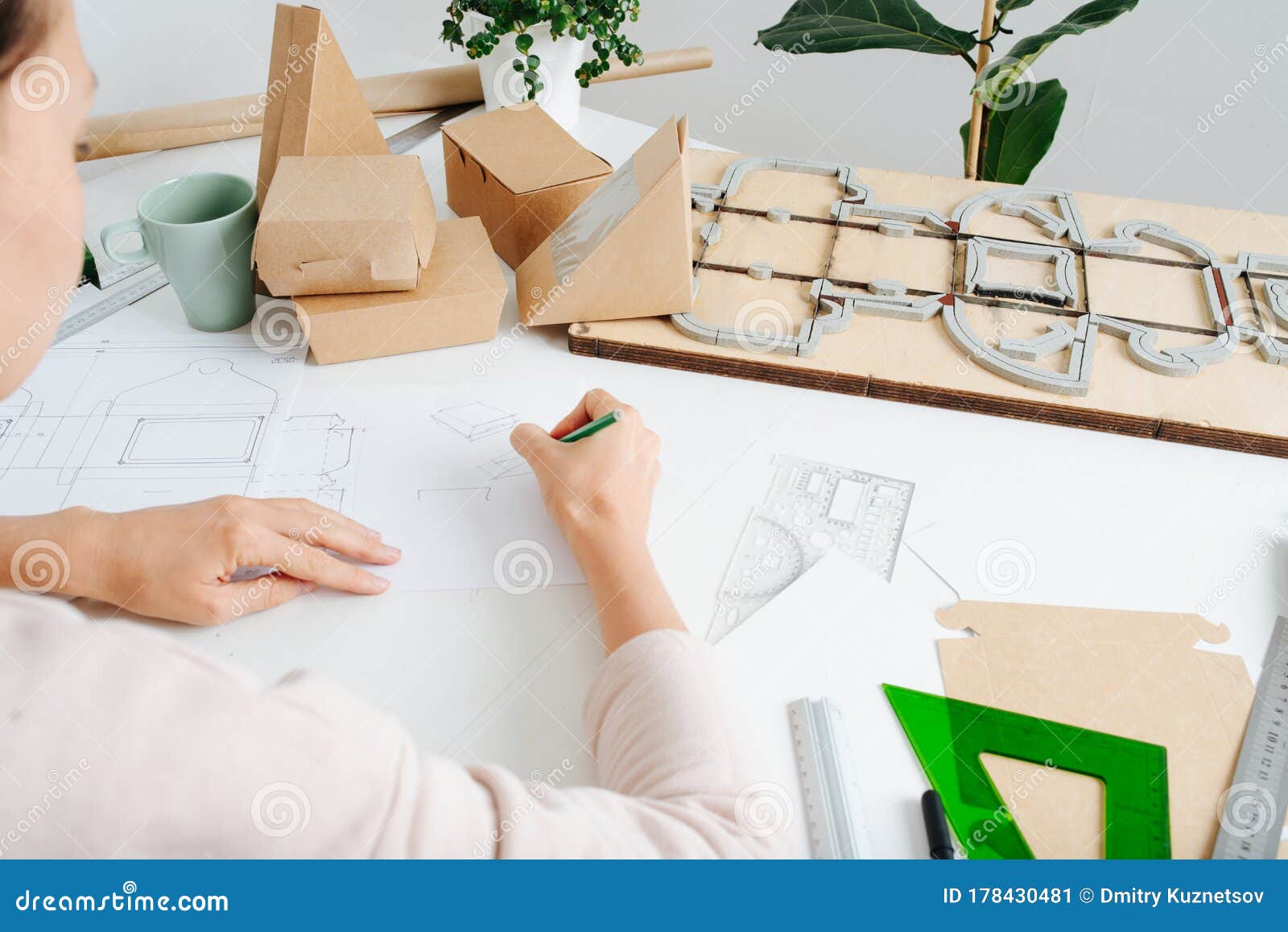 Close Shot of a Box Maker Working Behind a Desk, from Behind Stock ...