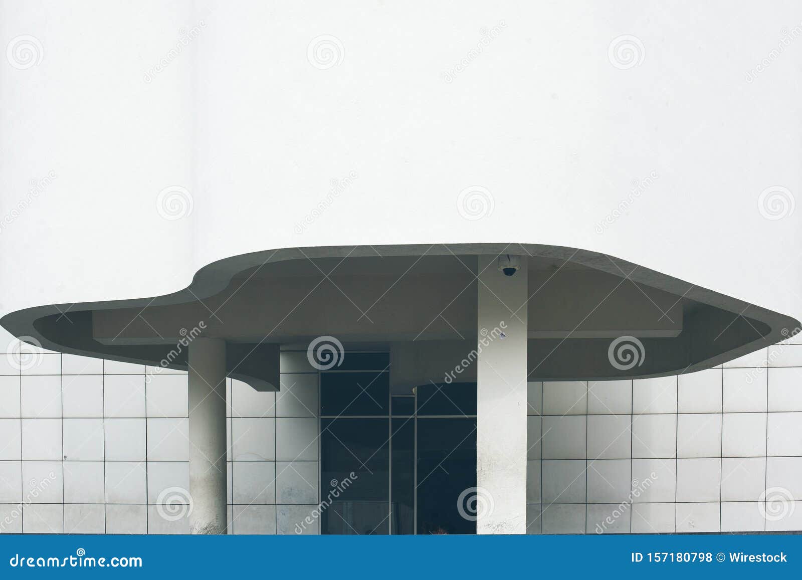 Close Shot of a Business Building Entrance with a Security Camera Stock ...