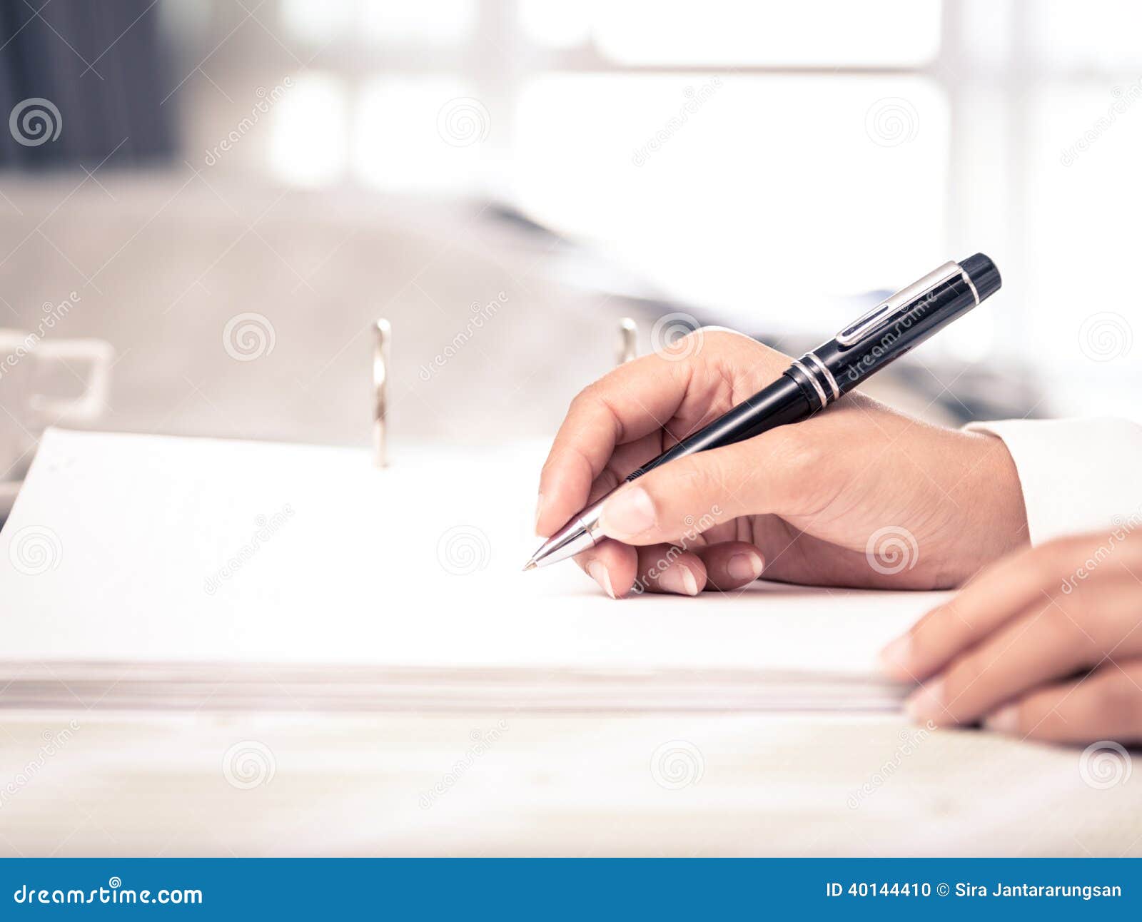 Close Shot of a Human Hand Writing Something on the Paper Stock Photo ...