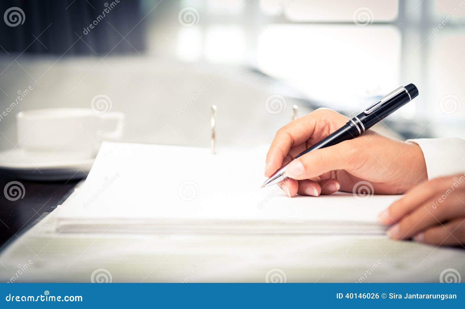 Close Shot of a Human Hand Writing Something on the Paper Stock Photo ...