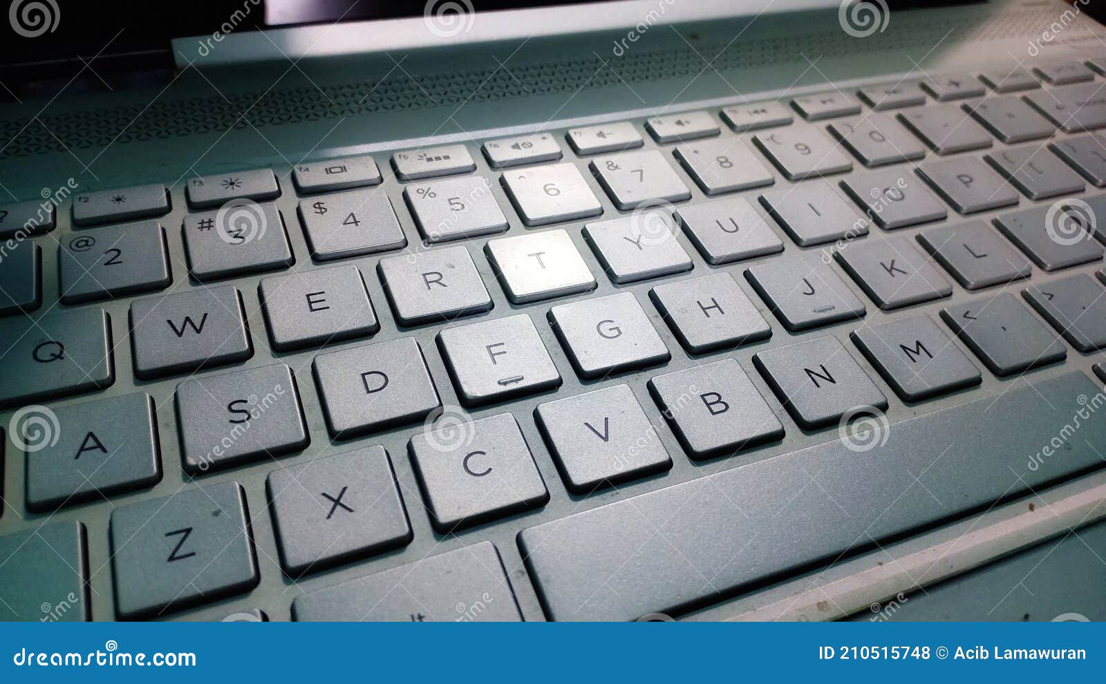 Silver laptop keyboard stock photo. Image of office - 210515748