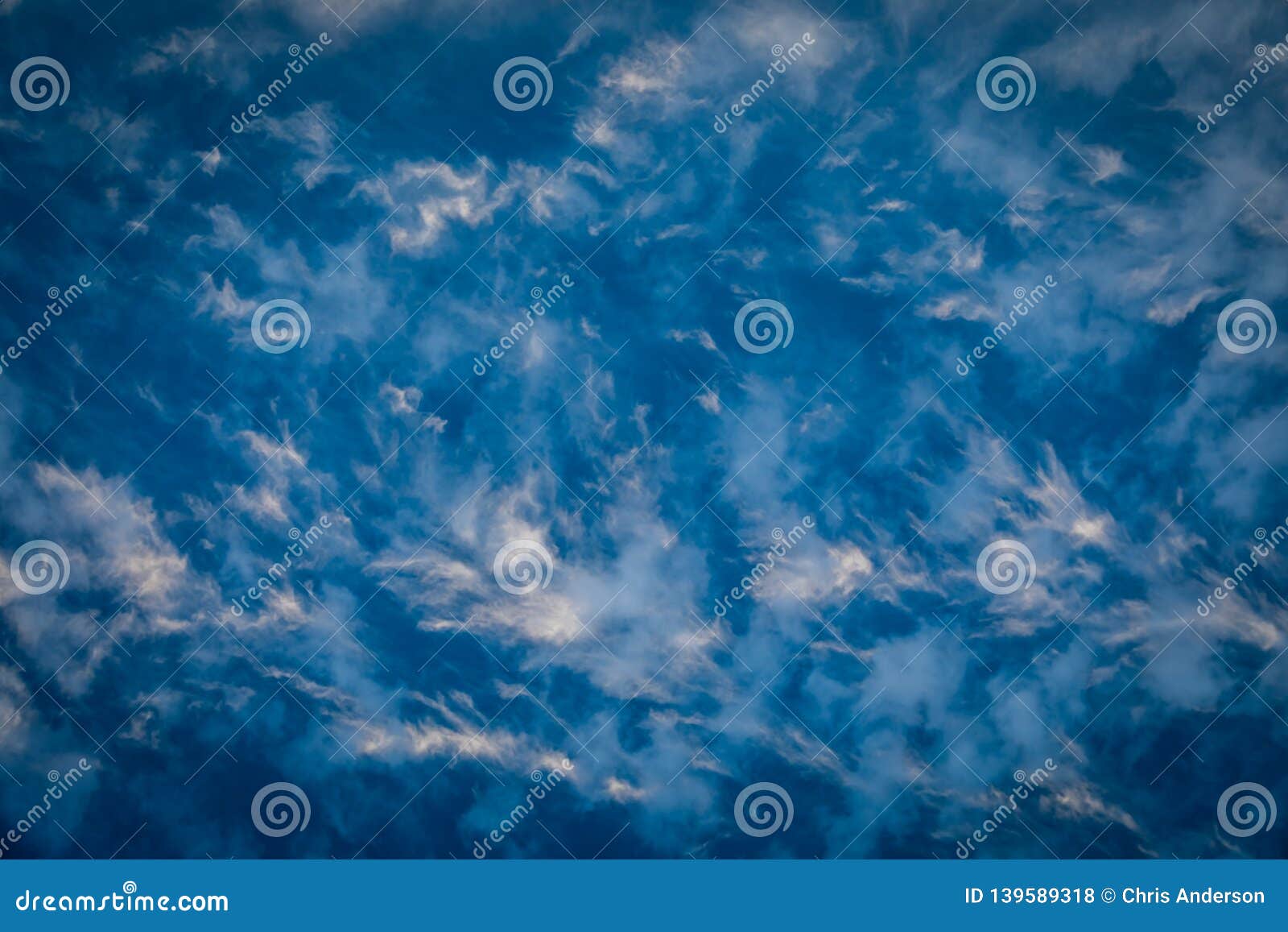 Deep Blue Sky with Feathery Clouds Stock Photo - Image of blue, epic ...
