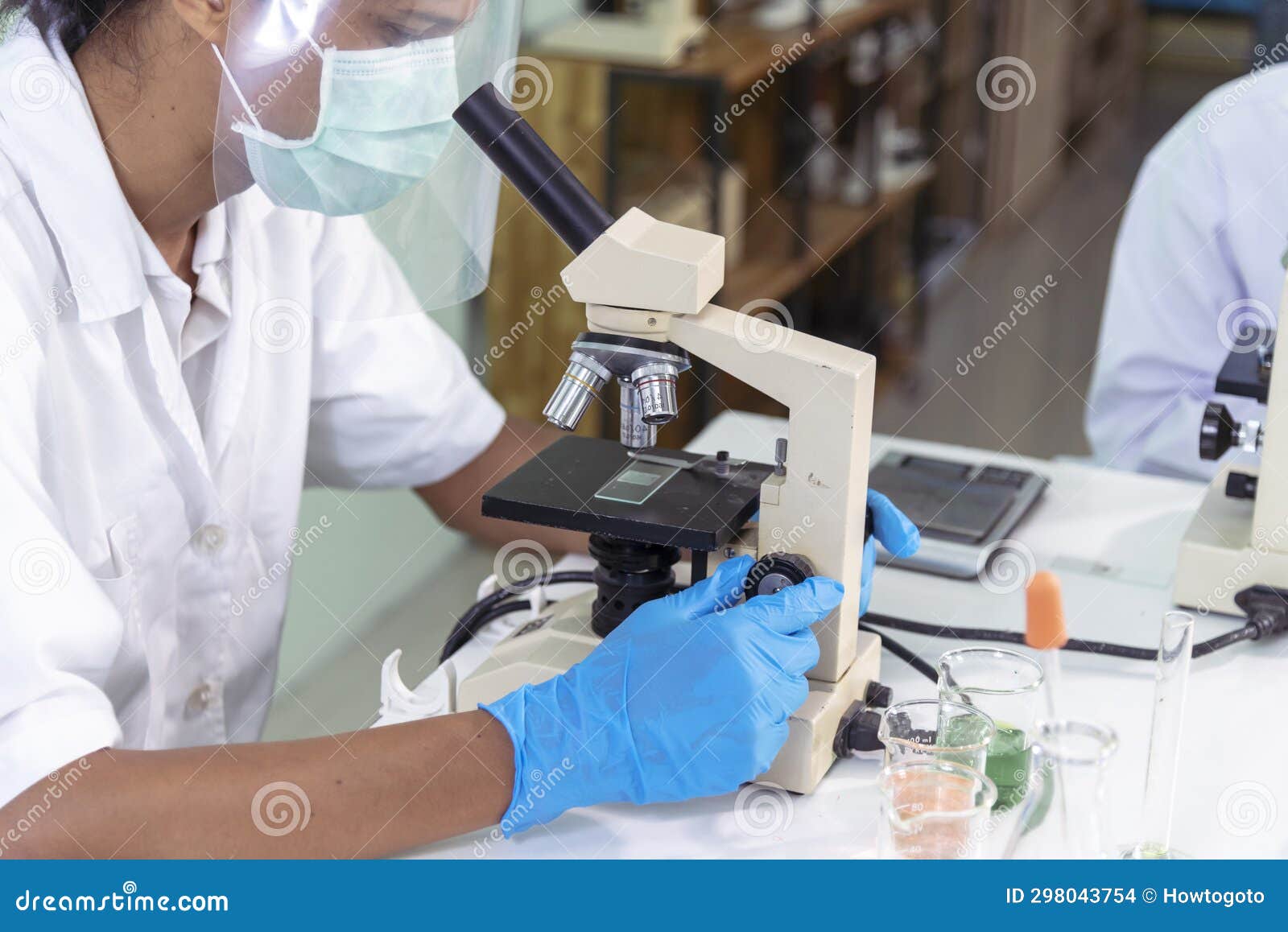 Close Up African American Scientist Man Hands Look into Microscope ...