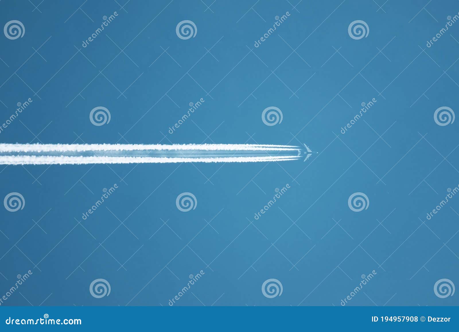 Close Up on Airplane Contrail Against Clear Blue Sky Stock Photo ...