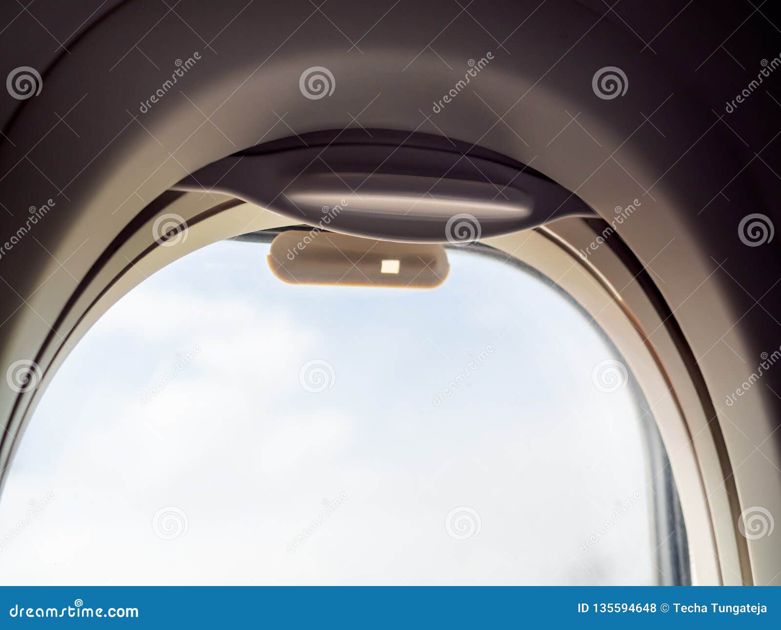 Close-up airplane window stock photo. Image of cloud - 135594648