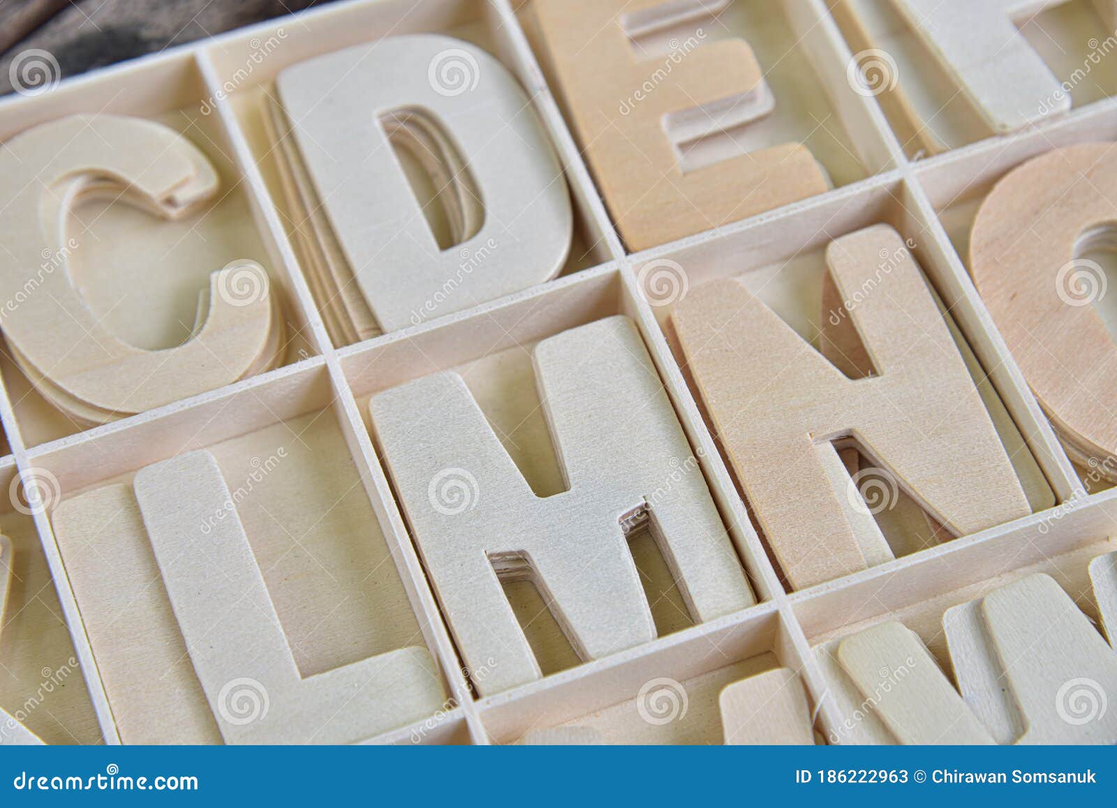 Close Up Alphabet on Brown Texture Stock Image - Image of square ...