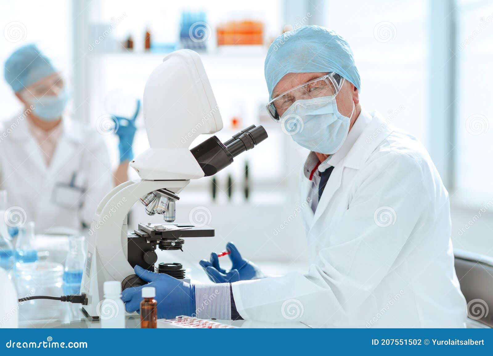 Close Up. Ambitious Scientist Sitting at a Laboratory Table Stock Photo ...