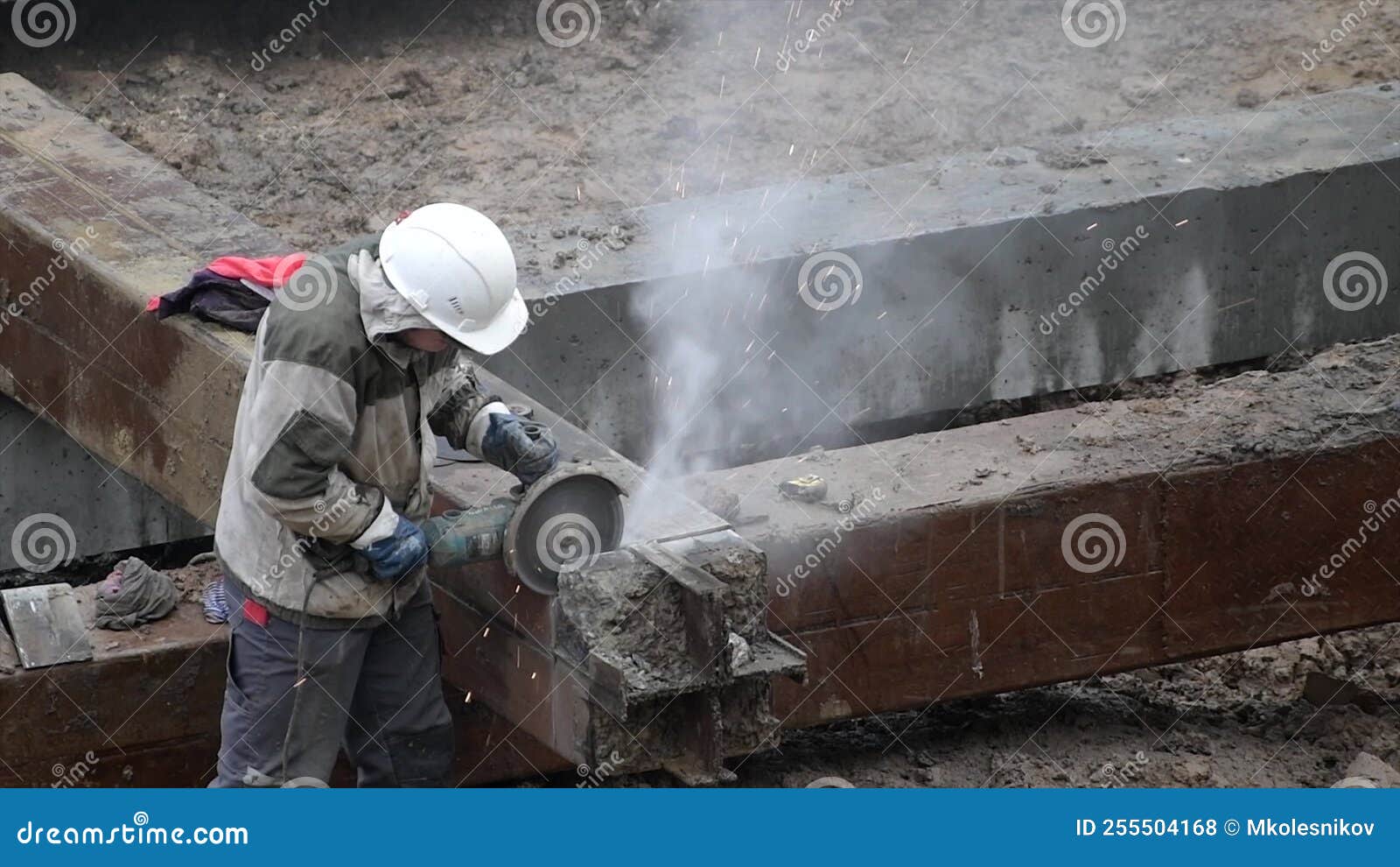 Angular Saw Grinding through Construction Piles at Construction Site ...