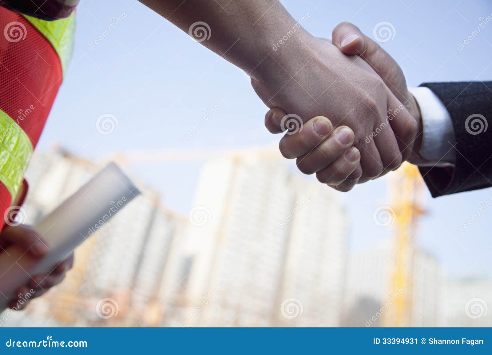 Close Up of Architect and Building Contractor Shaking Hands Stock Image ...