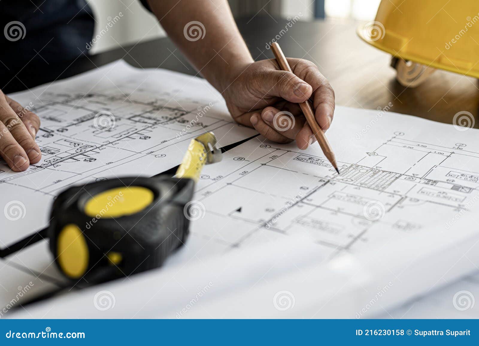 Close-up, the Architect is Solving the House Plan he Designed after it ...