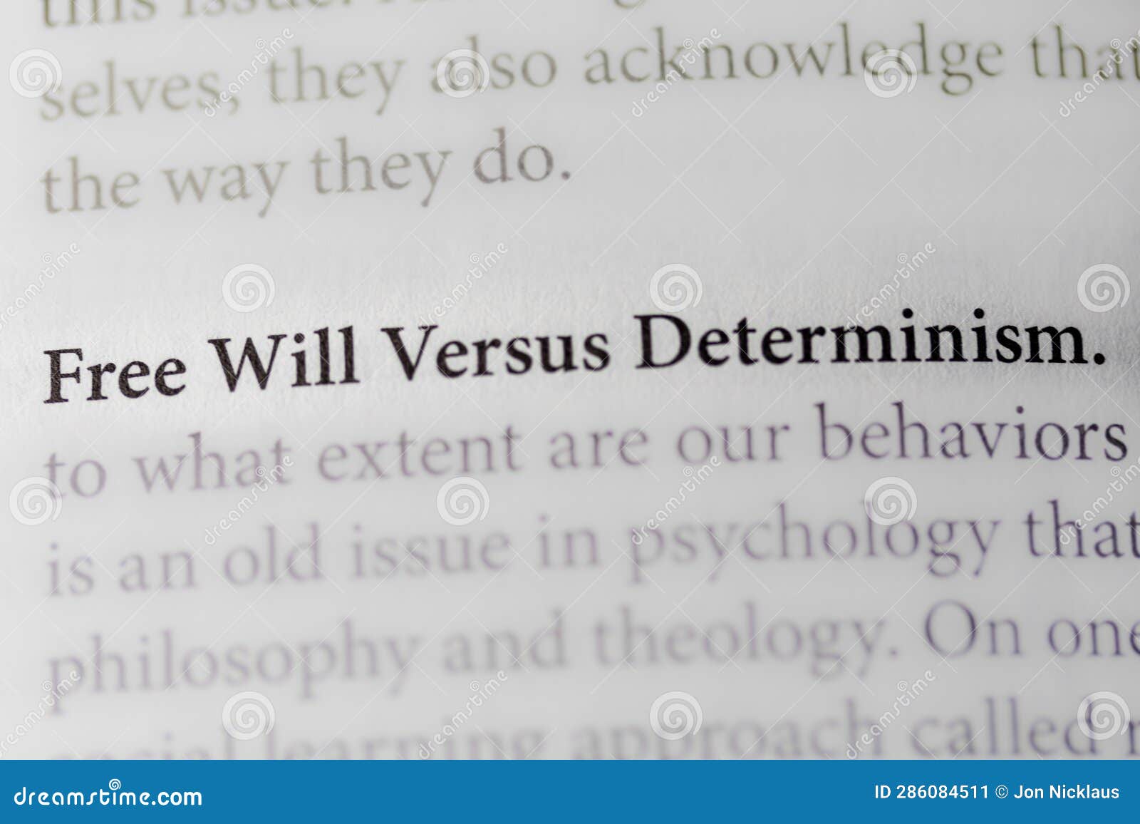 Close-up of the Argument of Free Will Versus Determinism, on Paper ...