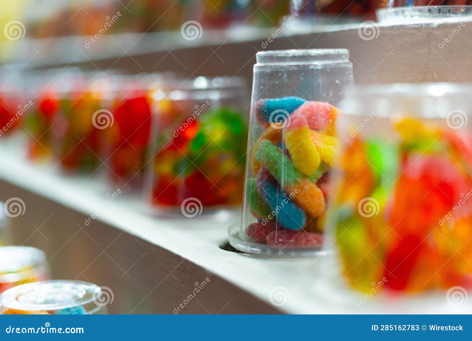 Close-up of an Array of Gummy Worms in Cups on a Carnival Stand Stock ...