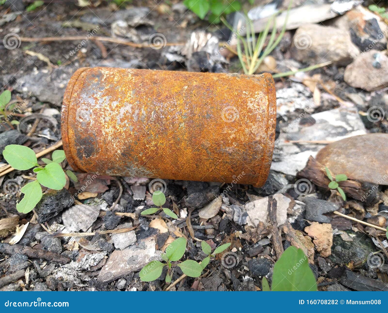 Ash and can on the ground stock photo. Image of material - 160708282