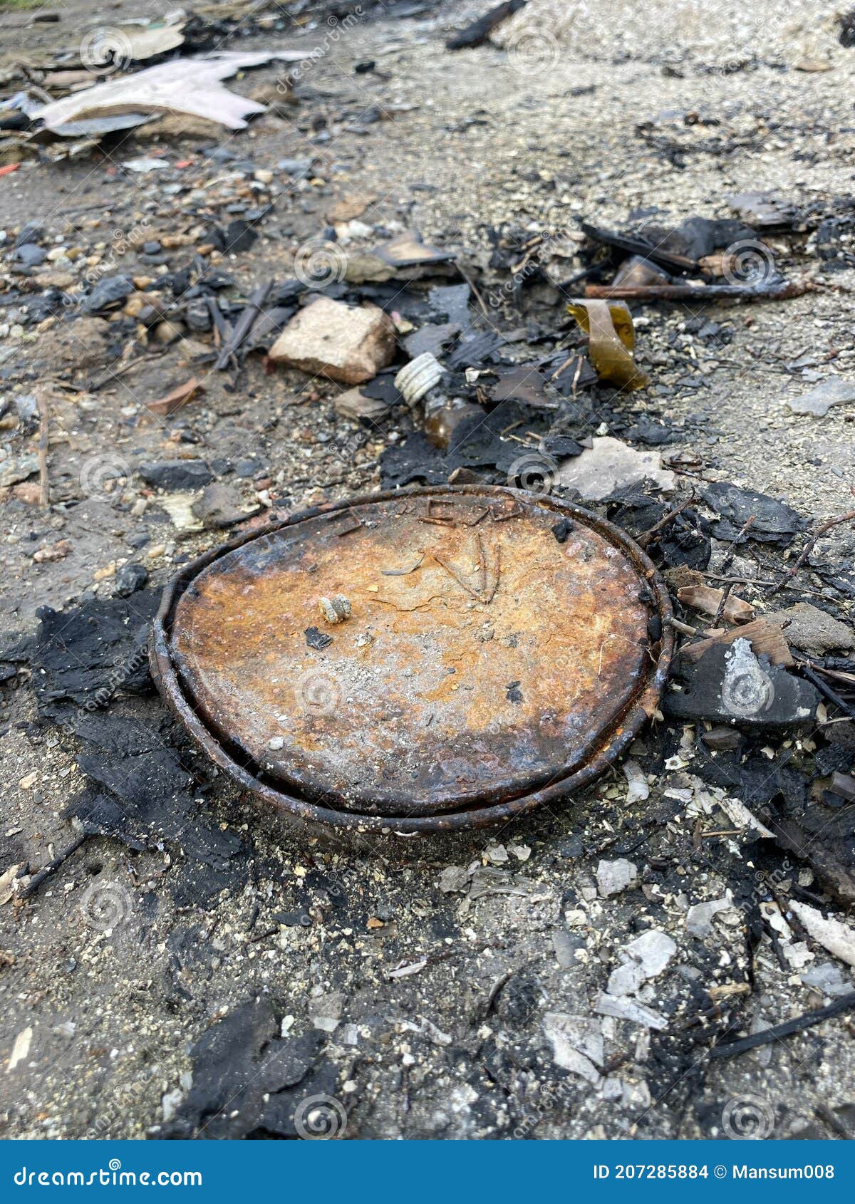 Ash and can on the ground stock photo. Image of natural - 207285884