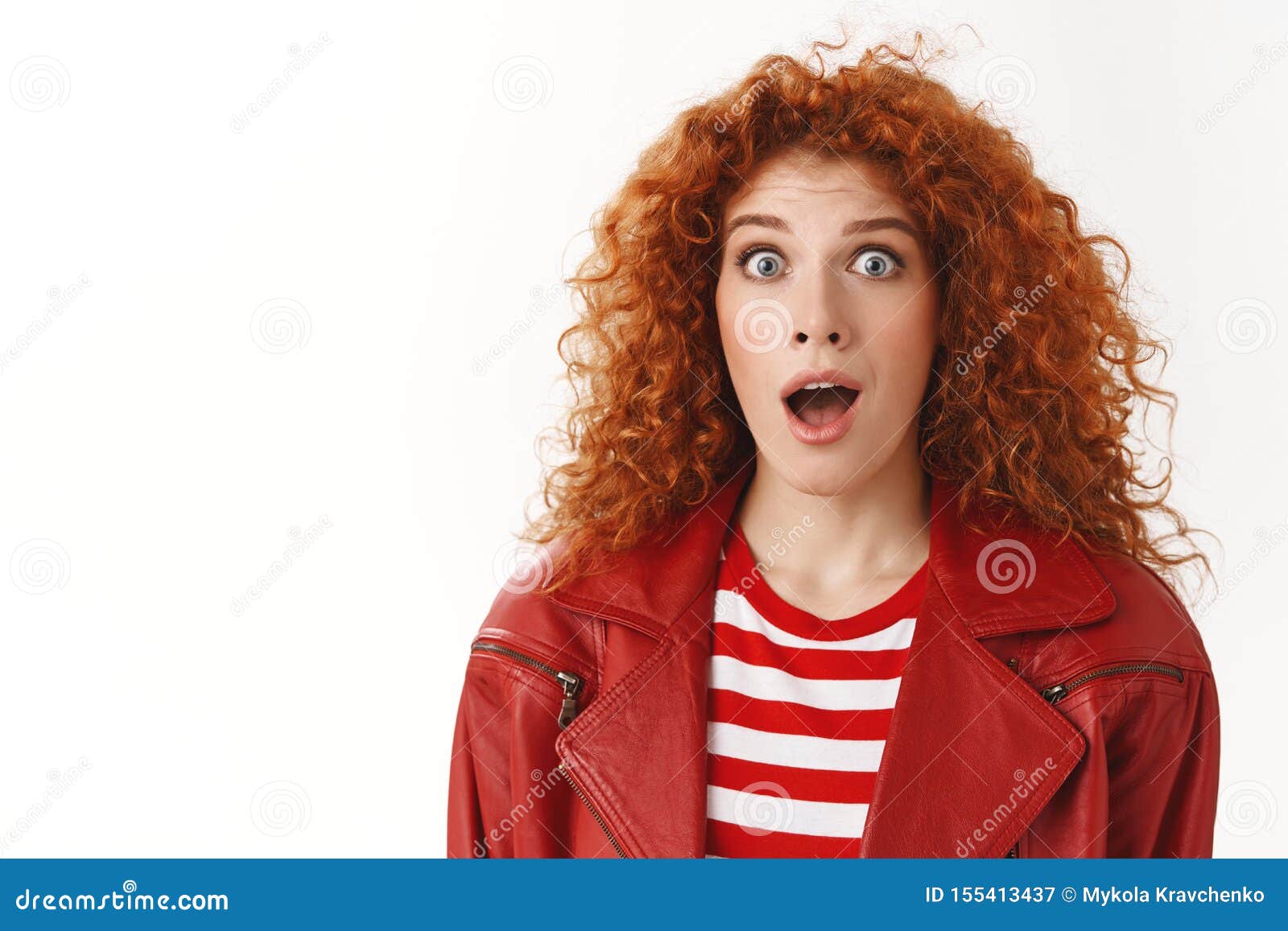Close Up Astonished Surprised Excited Redhead Curly Haired Girl Blue