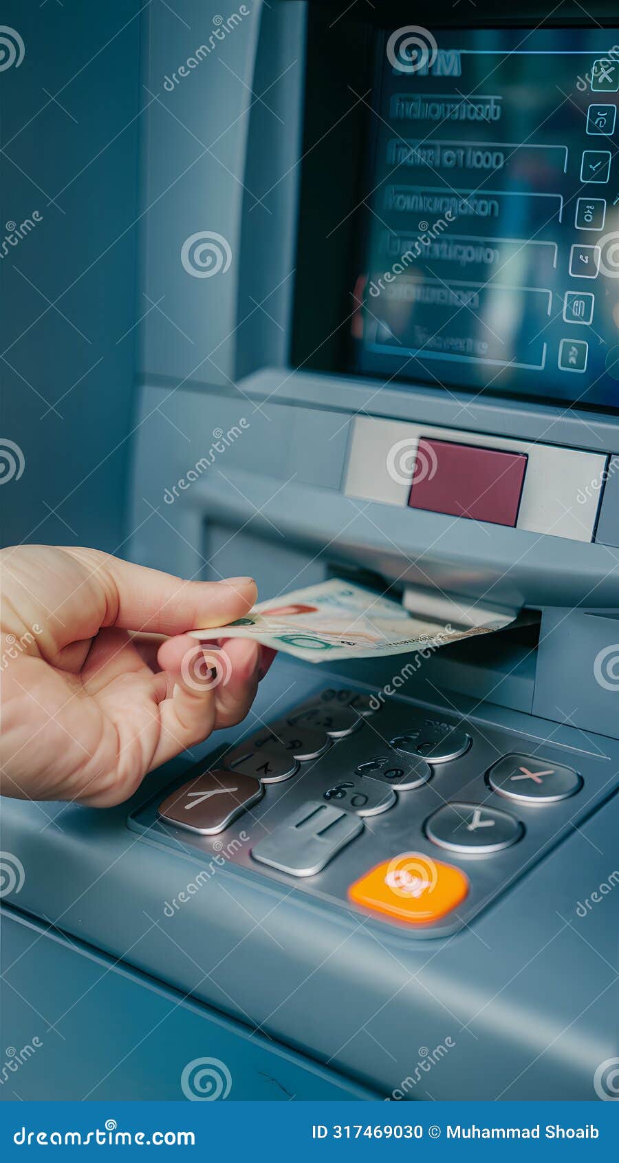 Close Up of ATM with Hand Inserting Banknote, Screen Displaying ...