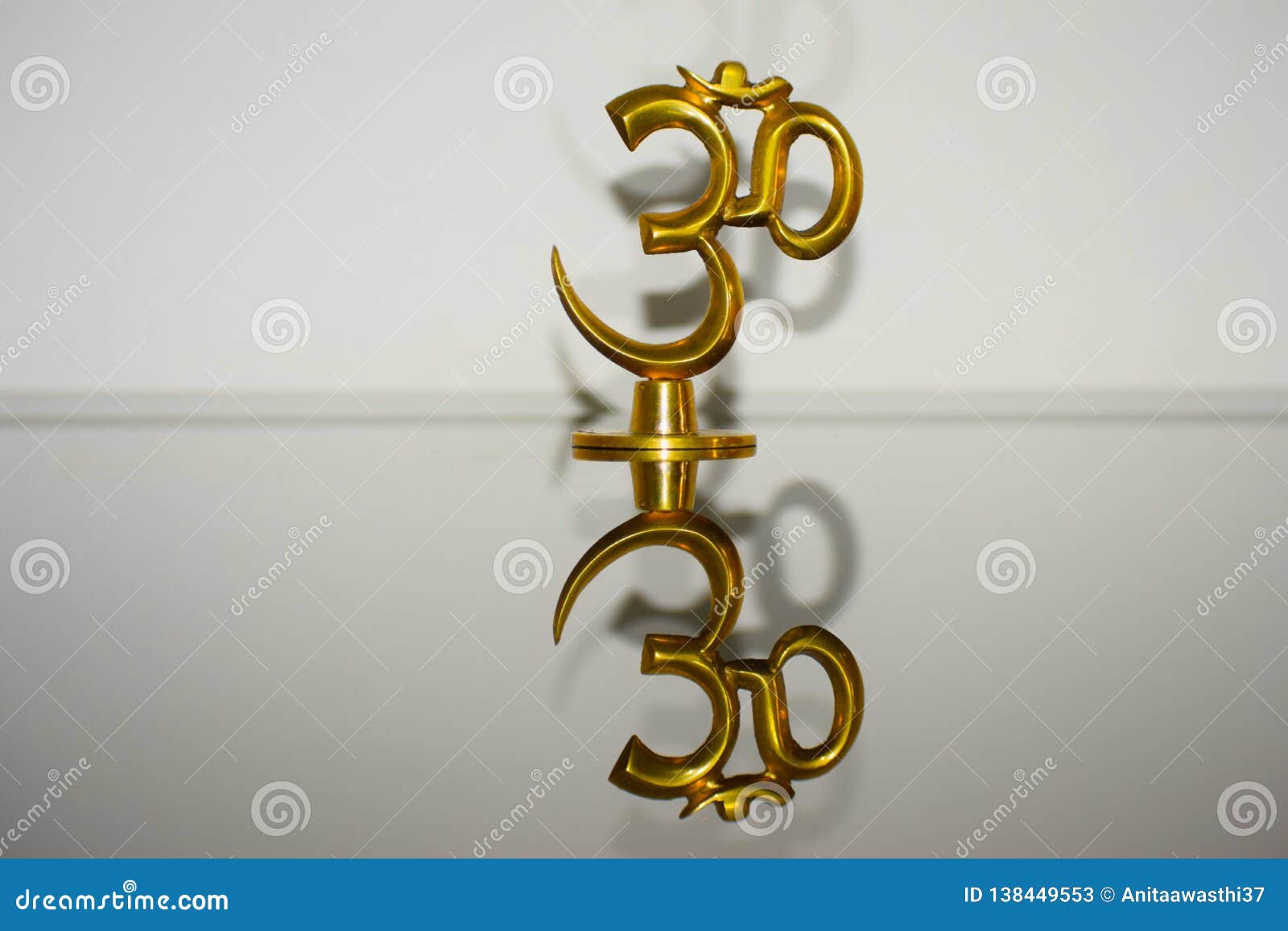 Close Up of Aum Symbol and Its Reflection Stock Image - Image of ...