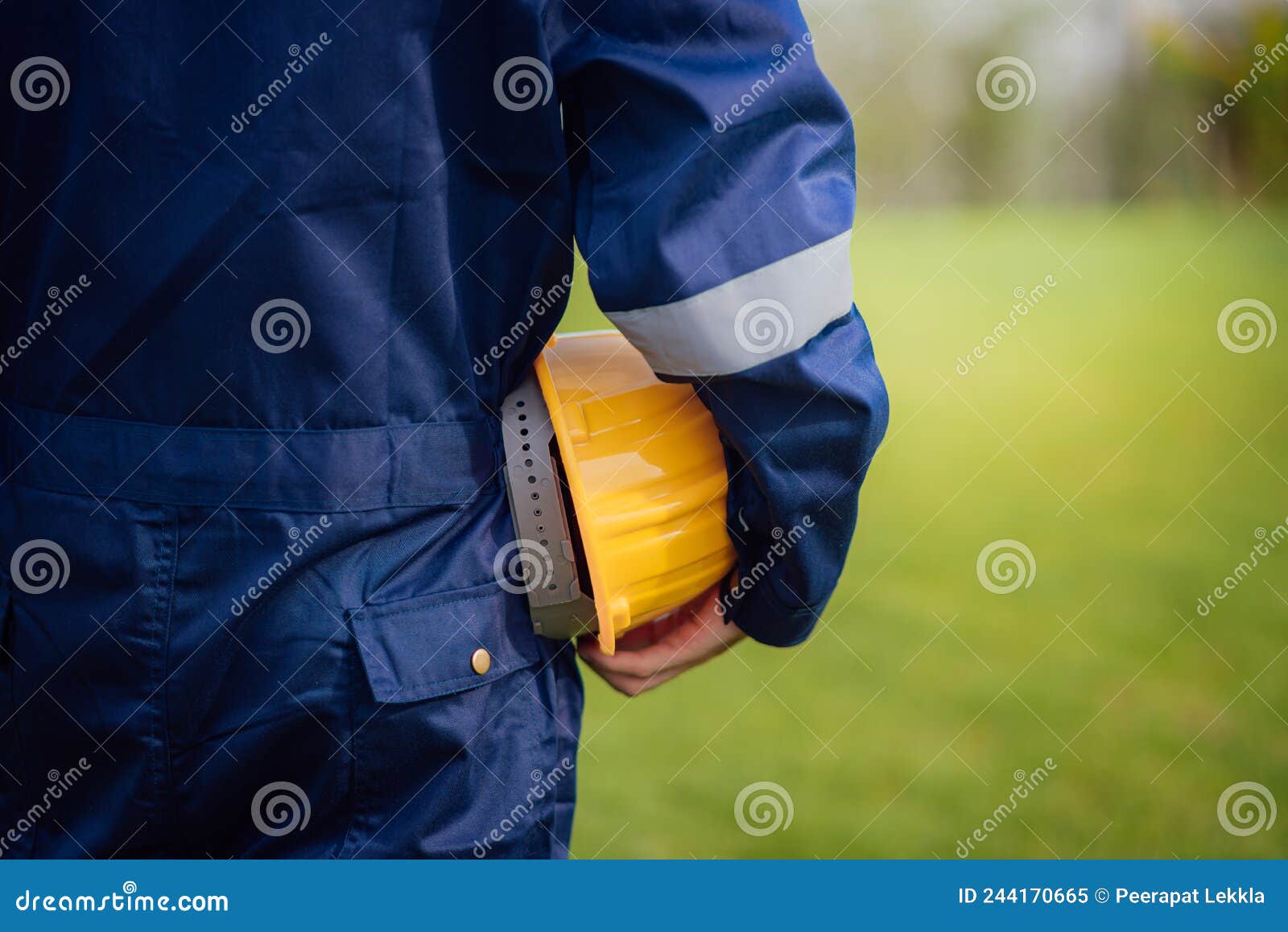 Close-up Backside View of Engineering Male Construction Worker Holding ...