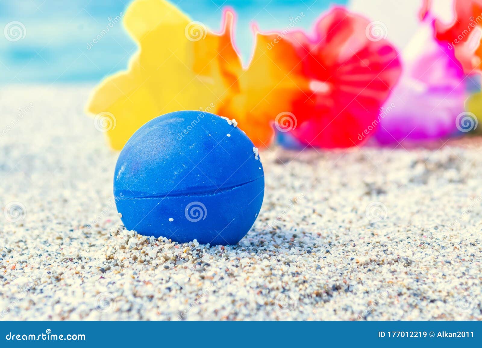 Close Up of a Ball and Other Beach Objects on the Sand Stock Image ...