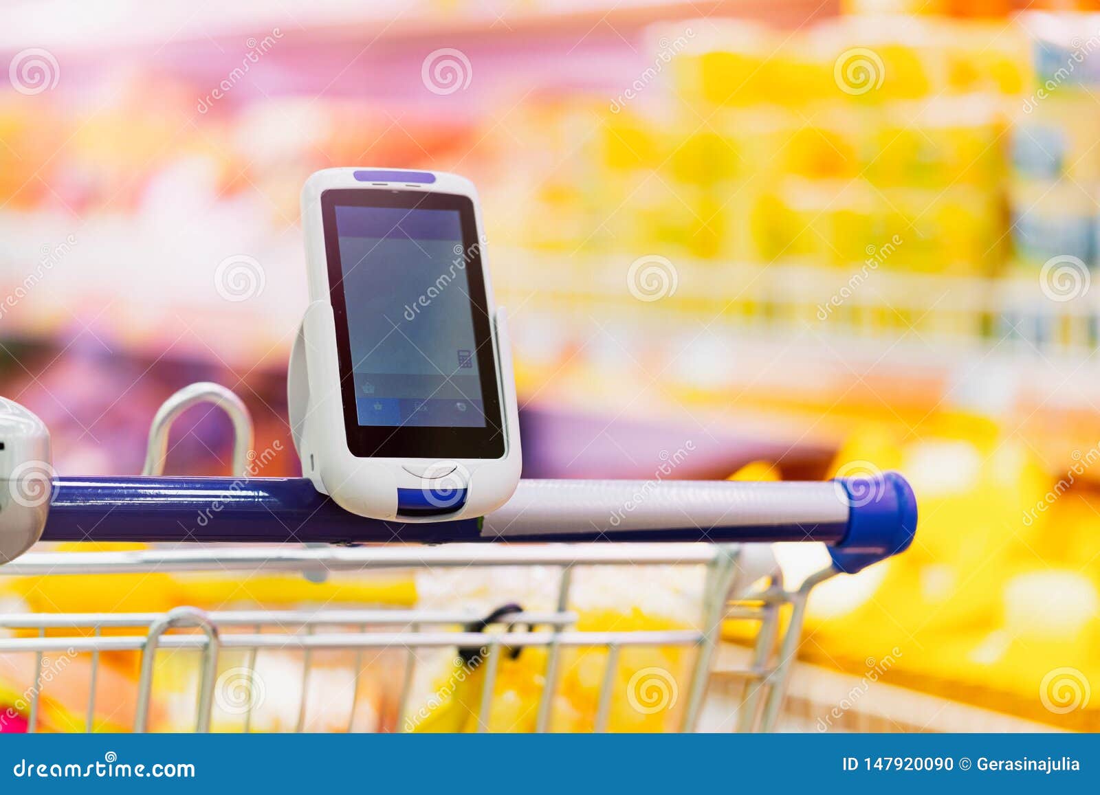 Close Up of Bar Code Scanner on Shopping Cart in Store. Concept of ...