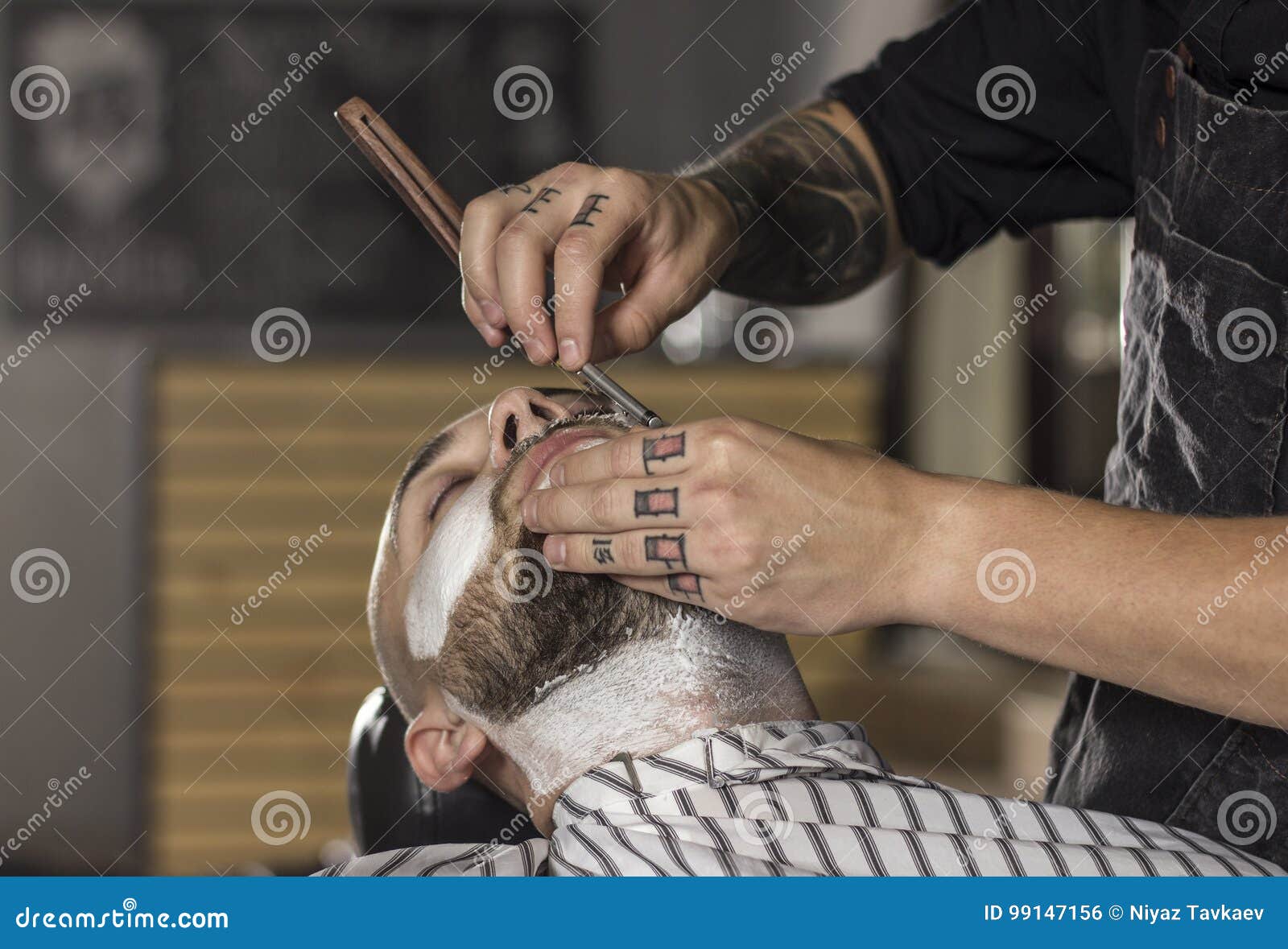 CLose Up of Barber Shaving Client Using Old Fashioned Razor Stock Photo ...