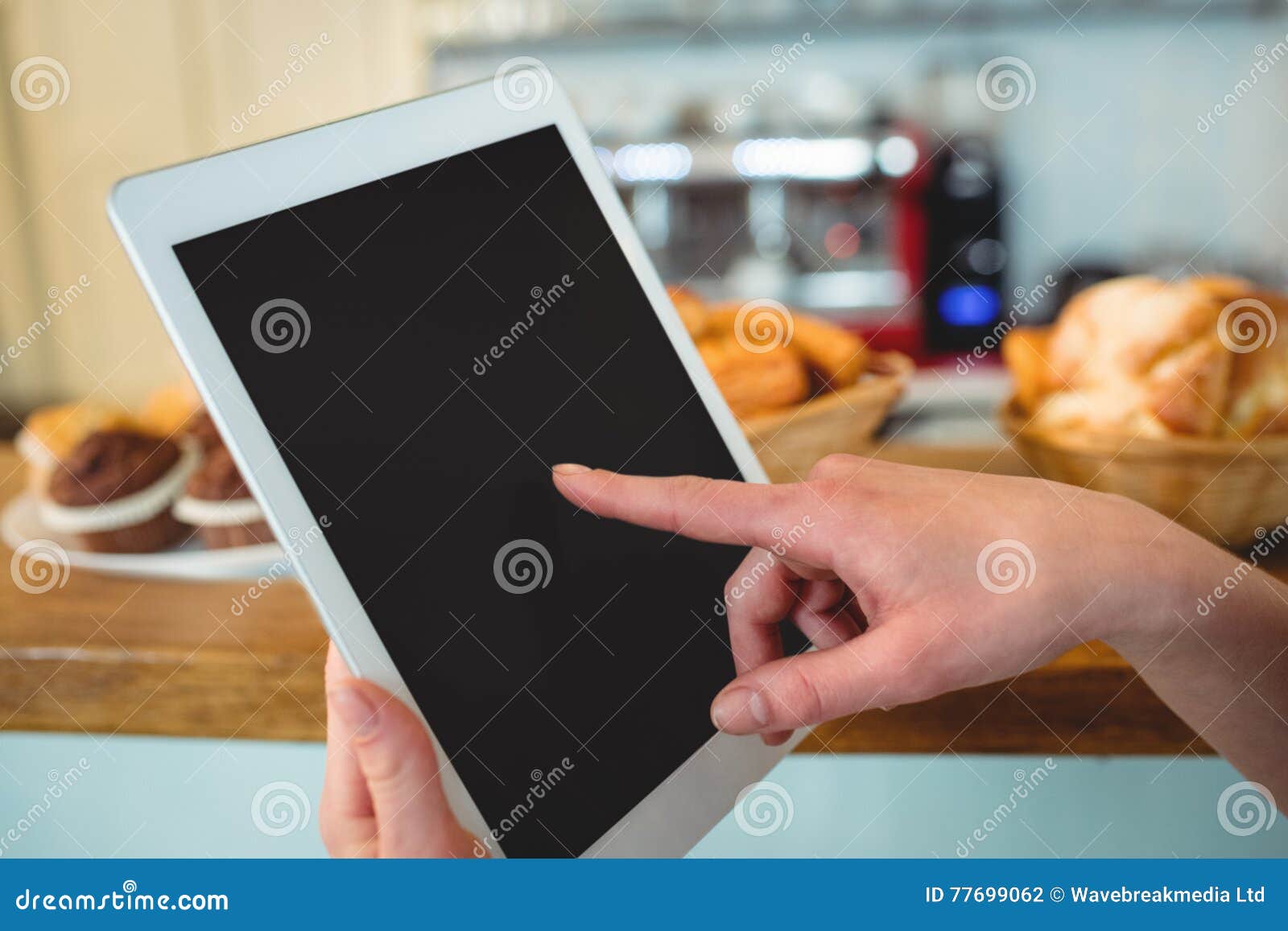 Close-up of Barista Finger Scrolling Tablet Pc at Cafe Stock Photo ...