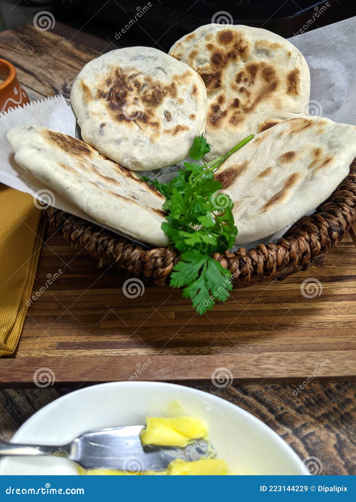 A Close Up of a Basket of Baati Roti for Breakfast Stock Image - Image ...