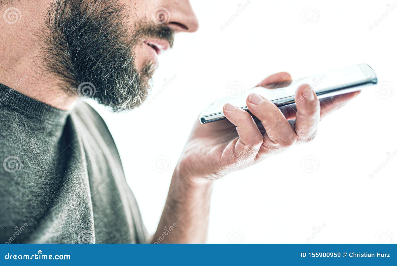 Bearded Caucasian Man Recording Voice Message or Using Voice Assistant ...