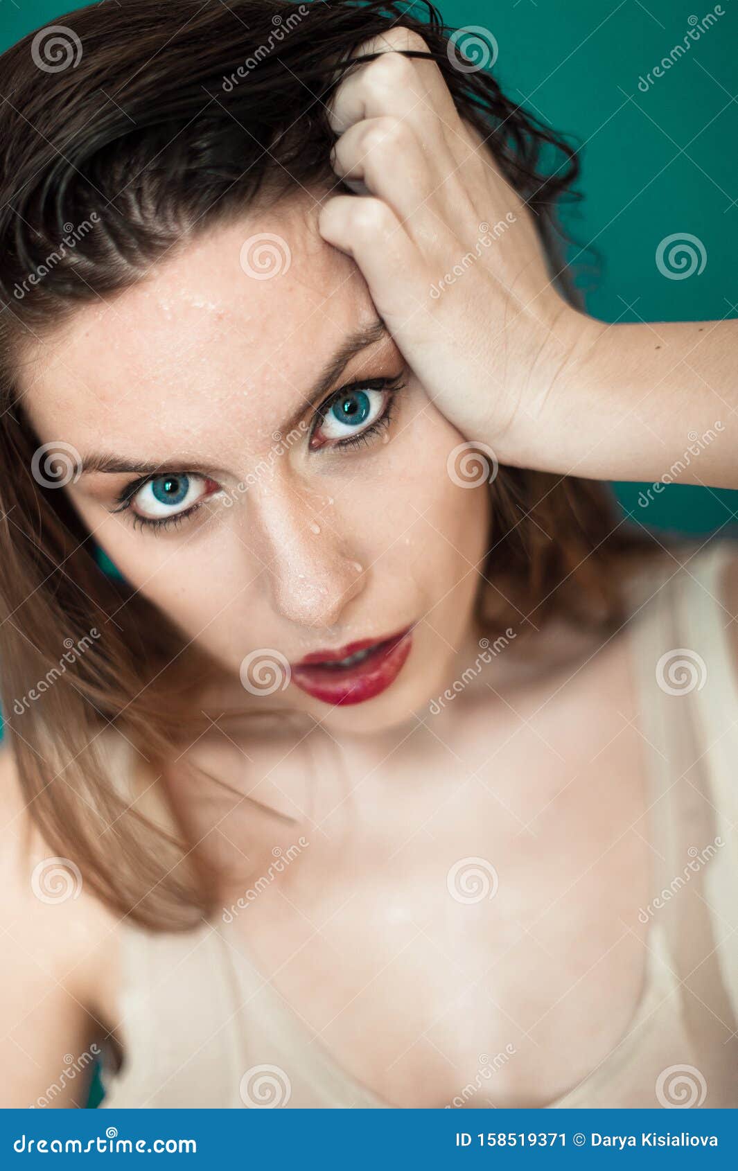 Close Up Of Beautiful Wet Woman Face With Water Drop On Green B Stock