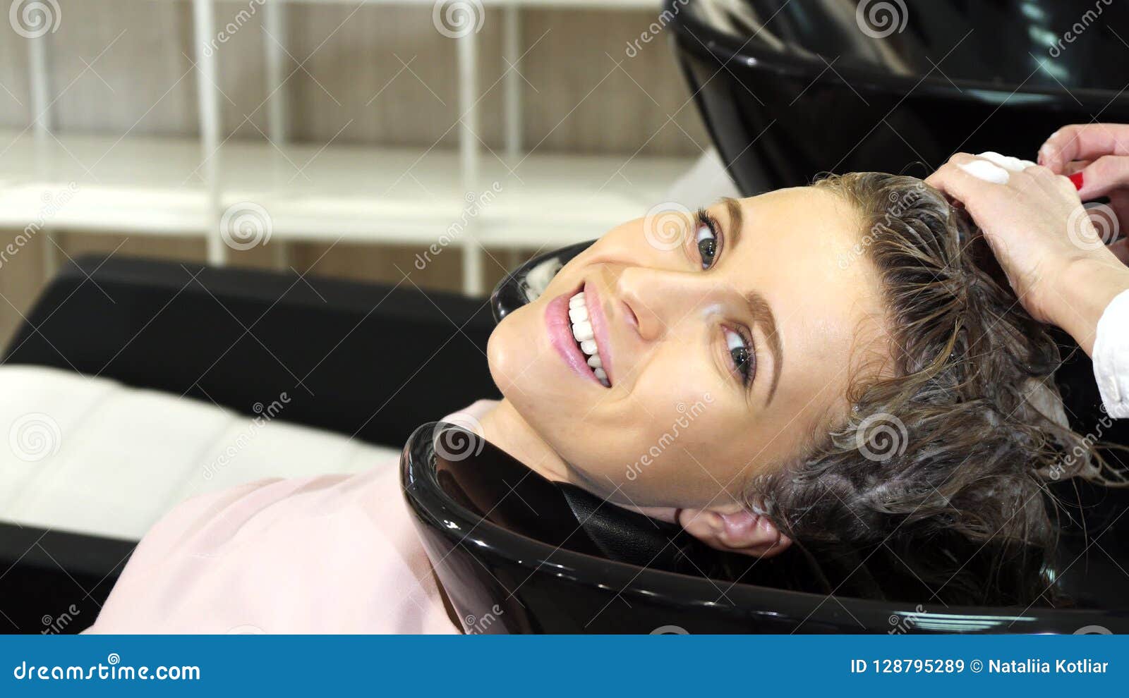 Close Up of a Beautiful Woman Getting Her Hair Washed at the ... Close Up of a Beautiful Woman Getting Her Hair Washed at the ...