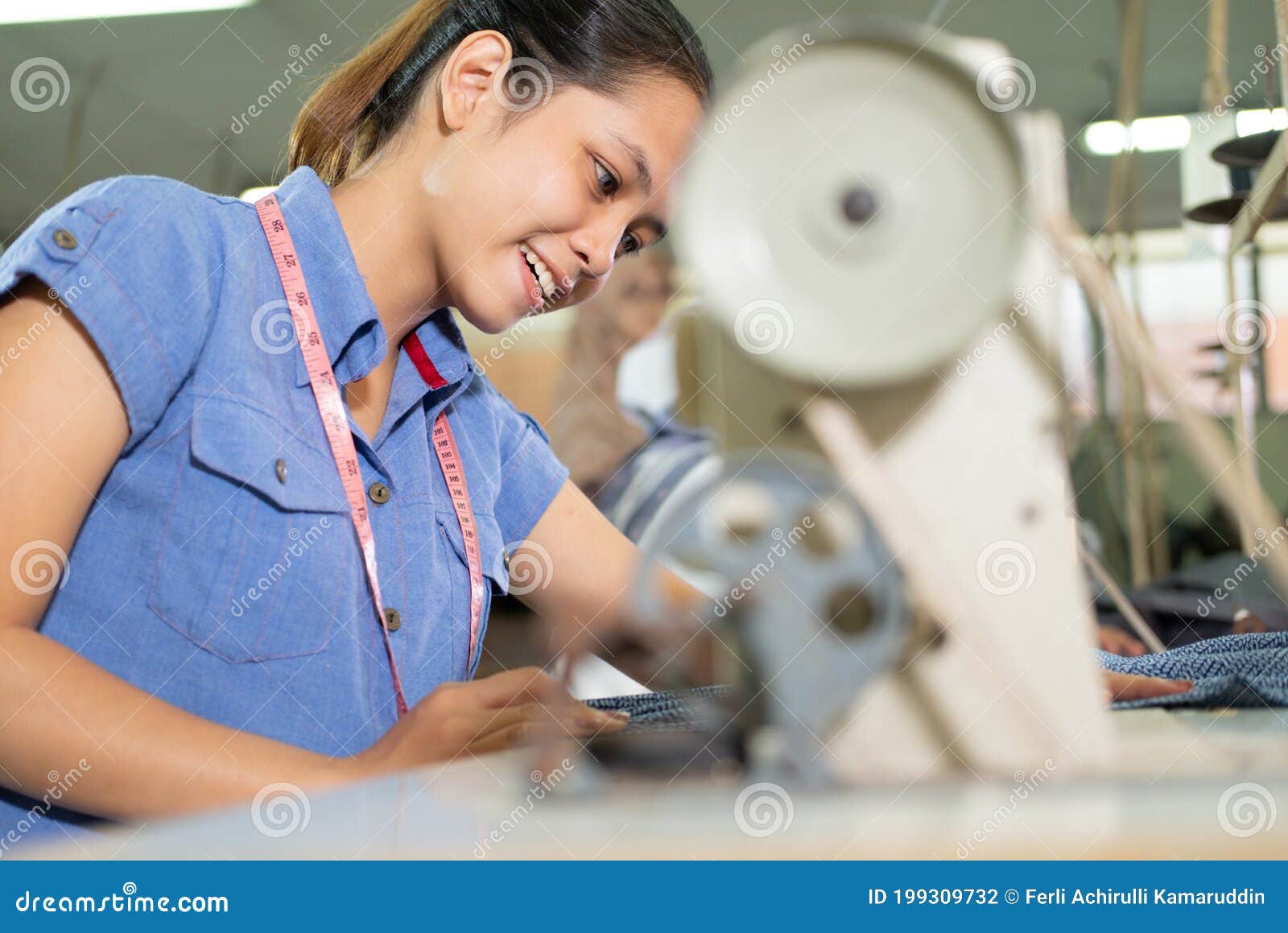 Close Up of a Beautiful Woman Smiling while Sewing Stock Photo - Image ...