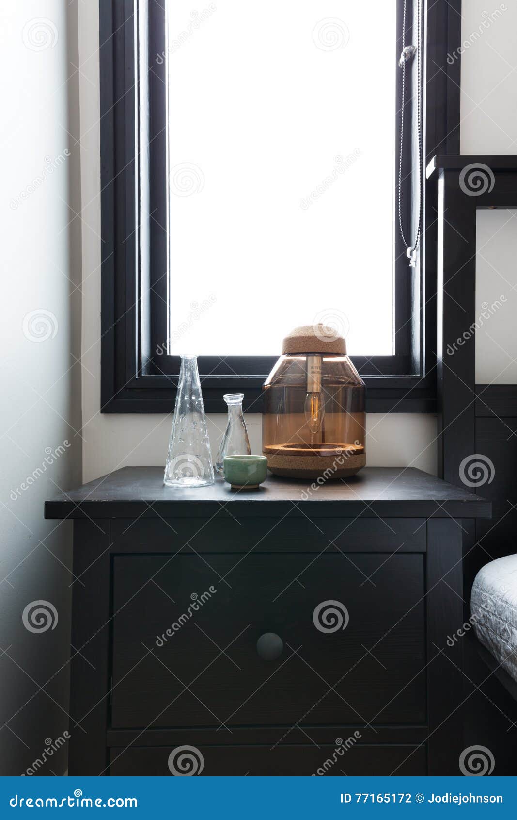 Close Up of Bedside Table with Ornaments and Bright Window Behind Stock ...