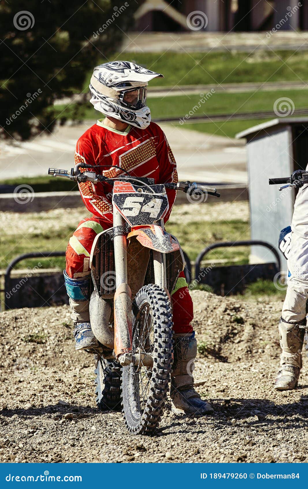 Close-up of Biker Sitting on Motorcycle in Starting Point before the ...