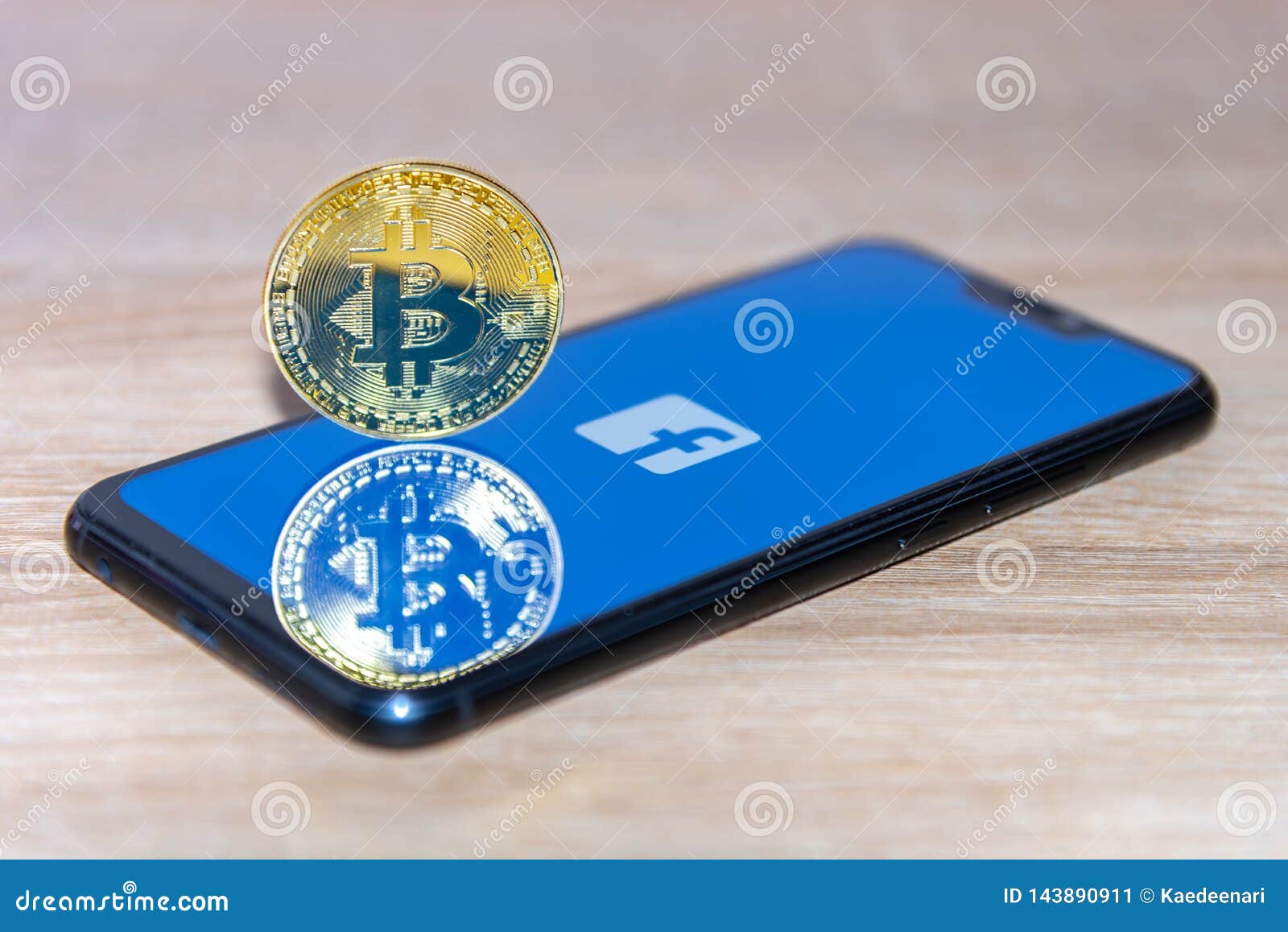 Bitcoin Coin with the Facebook Logo on a Smartphone Screen Editorial ...