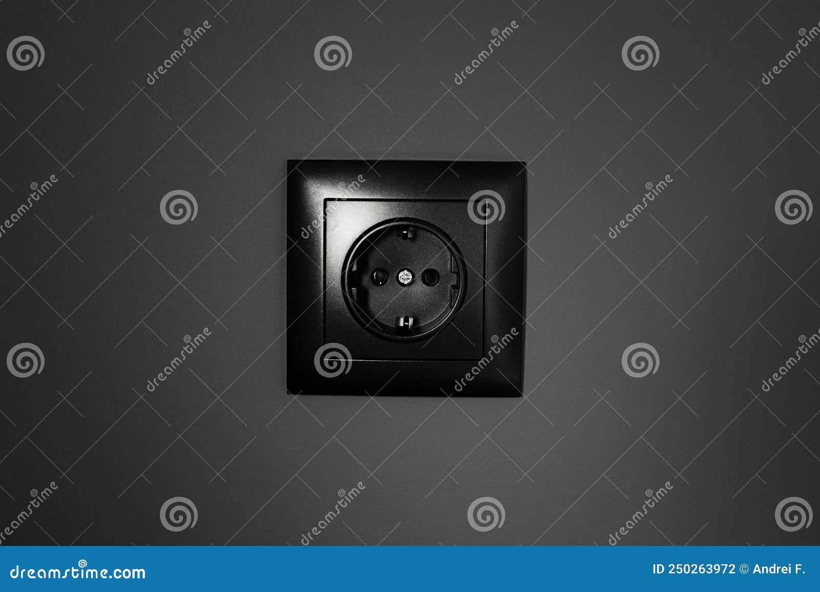 Close-up of Black Socket on Background of Grey Wall. Stock Photo ...
