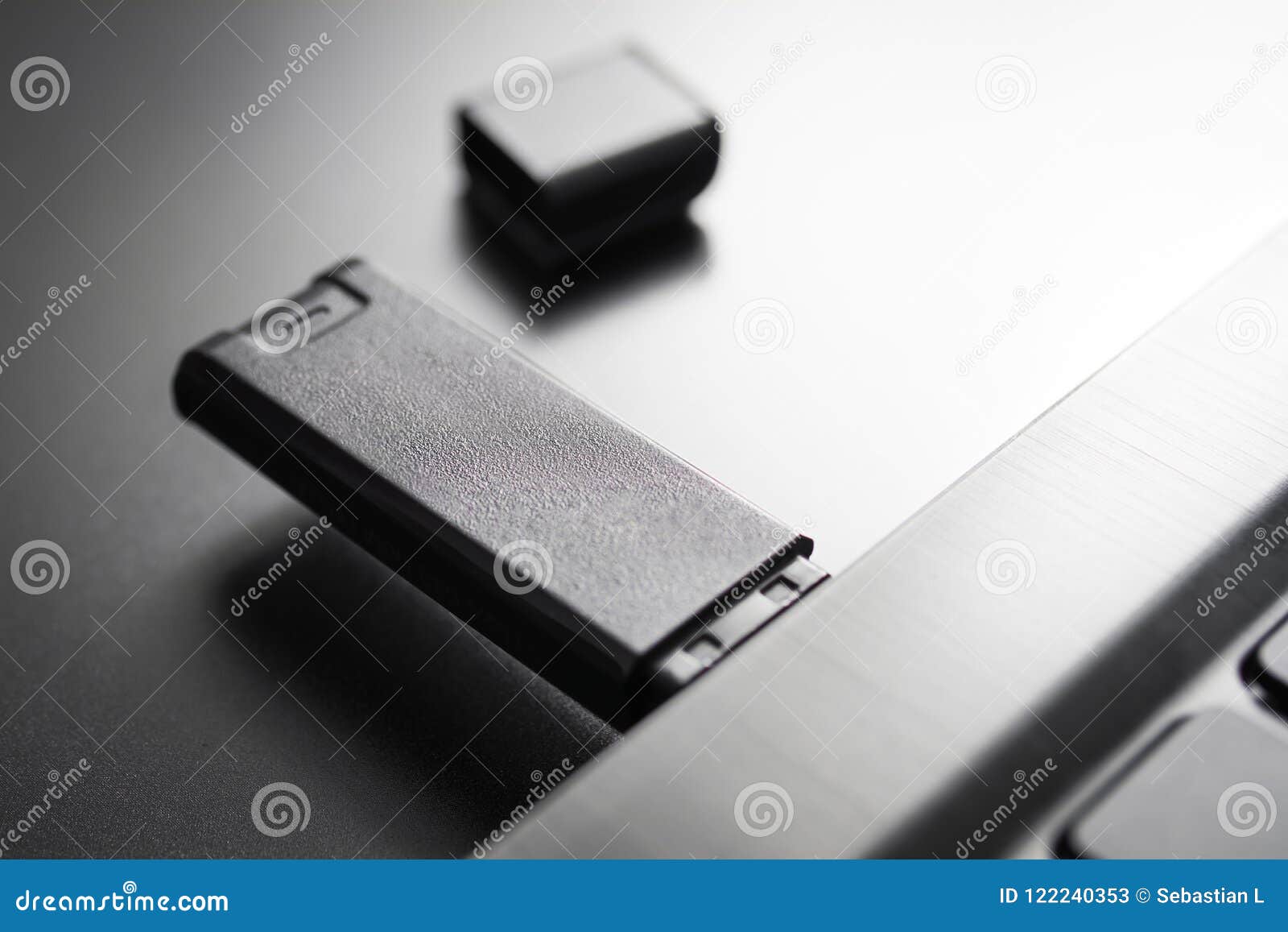 Close-Up of a Black USB Memory Stick Plugged into the USB Port of a ...