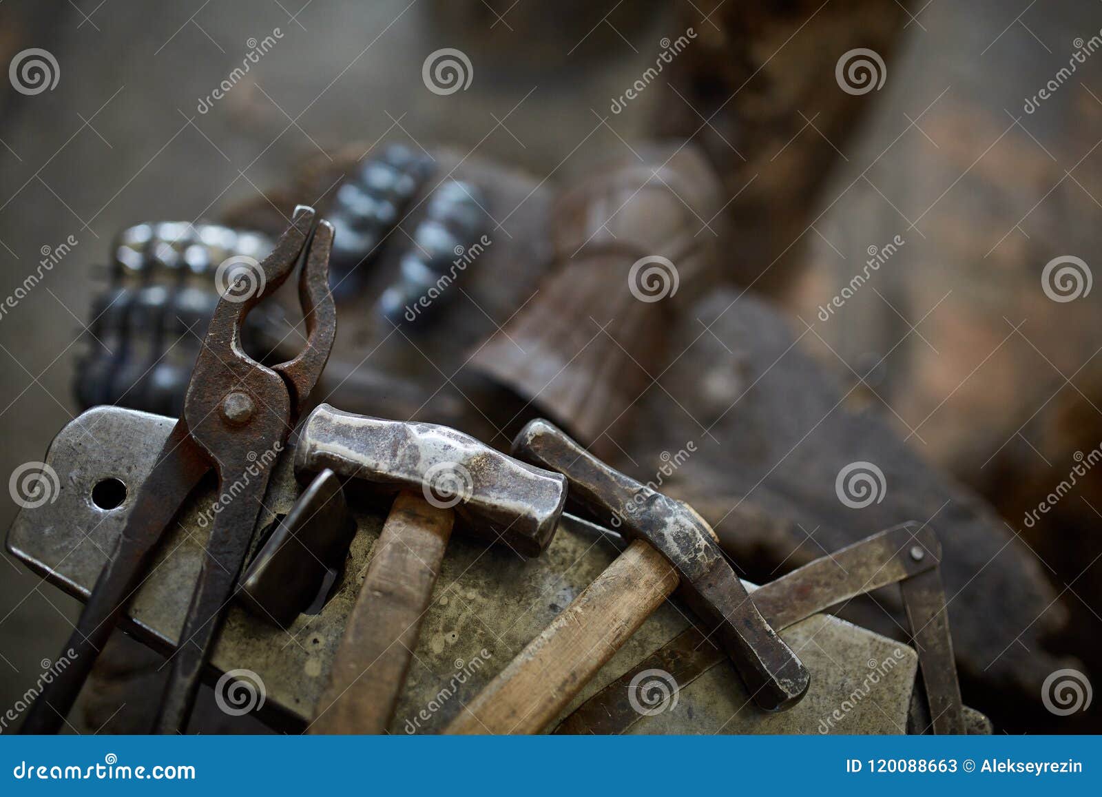 Close-up of a Blacksmith`s Hands Manipulating a Metal Piece Above His ...