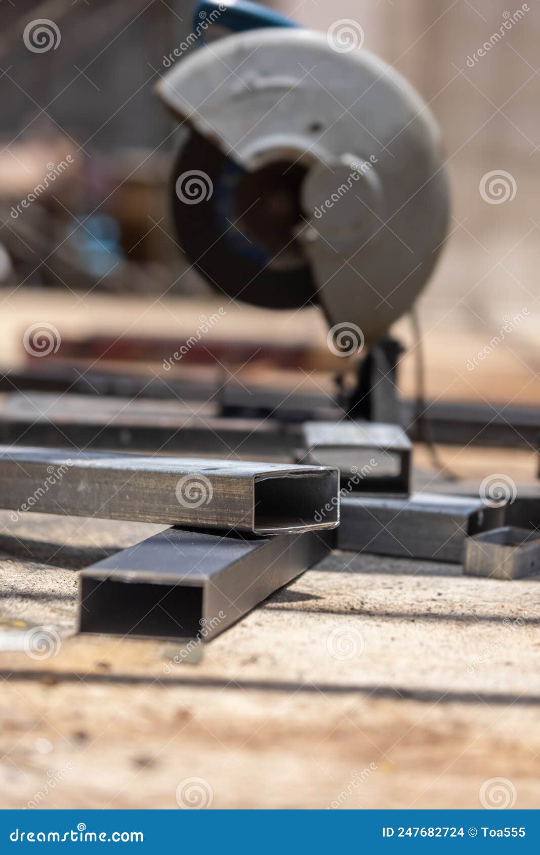 Blade Saw Cutting Steel Rectangular Pipe in Construction Site Stock ...