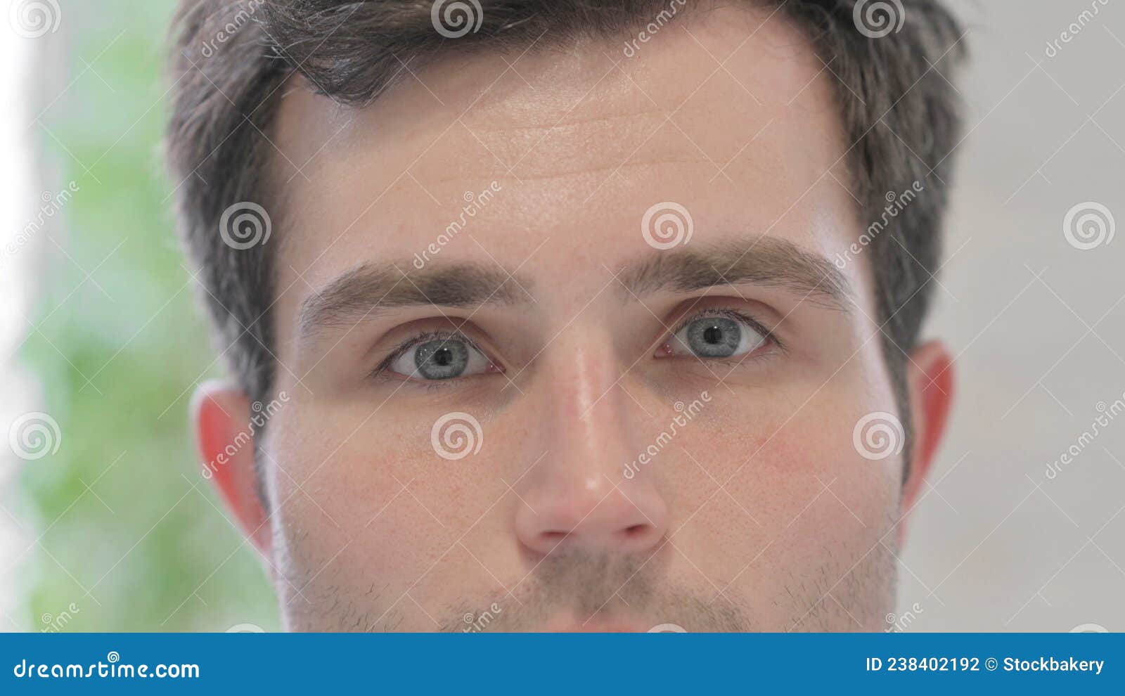 Close Up of Blinking Eyes of Man Looking at the Camera Stock Photo ...