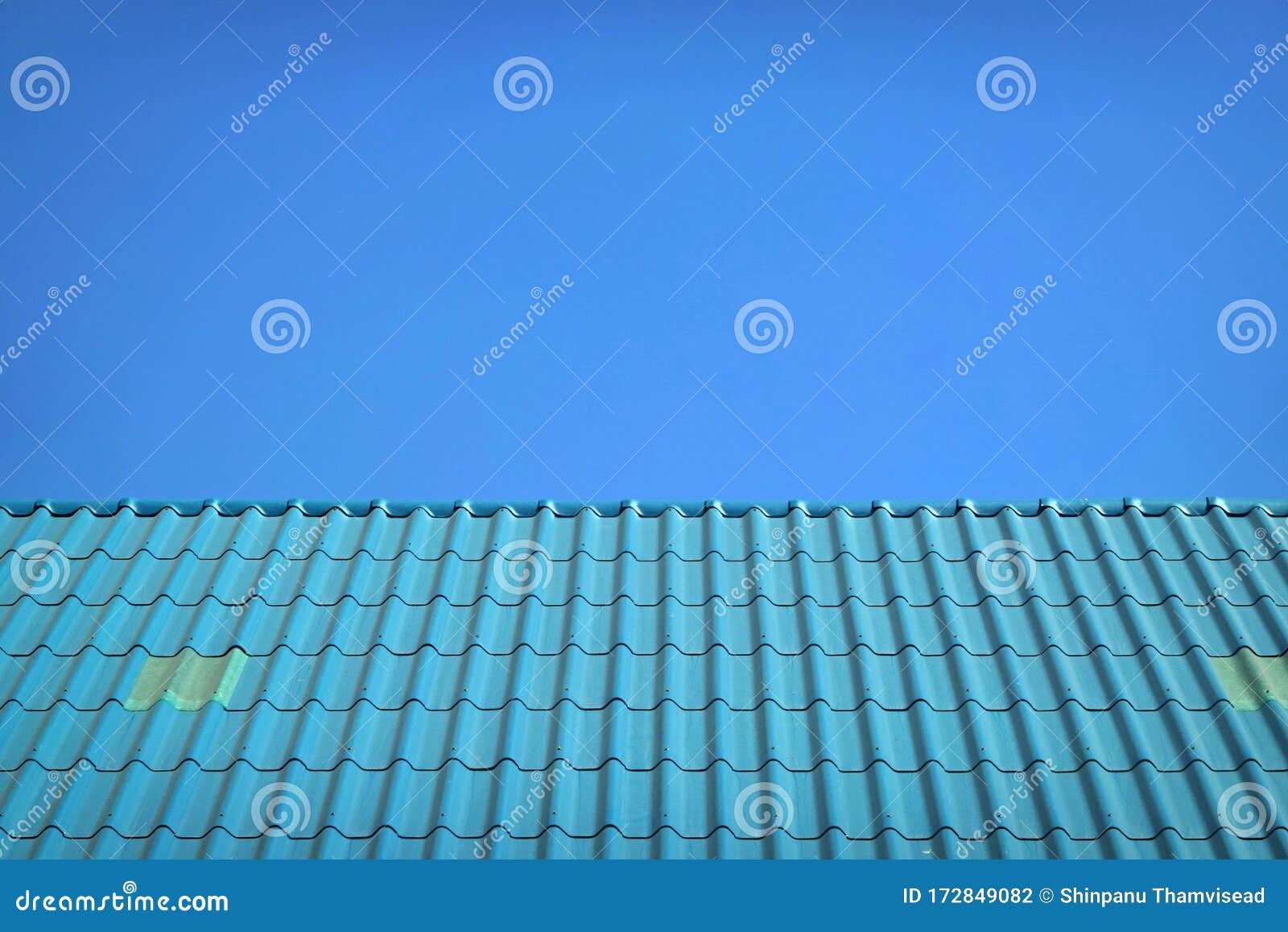 Close Up, the Blue Double Roofing Tiles are Outdoors. Sky Background ...