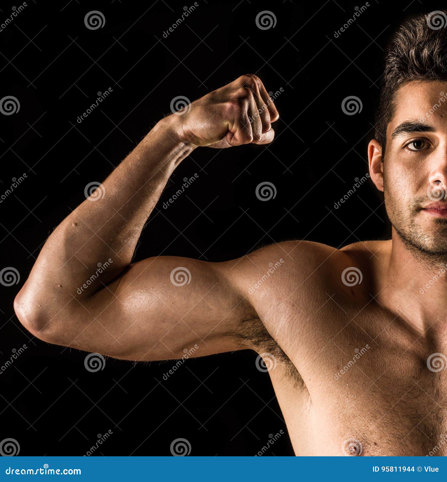 Close Up on a Bodybuilder Biceps, Shoulder, Arm, and Face Stock Photo ...