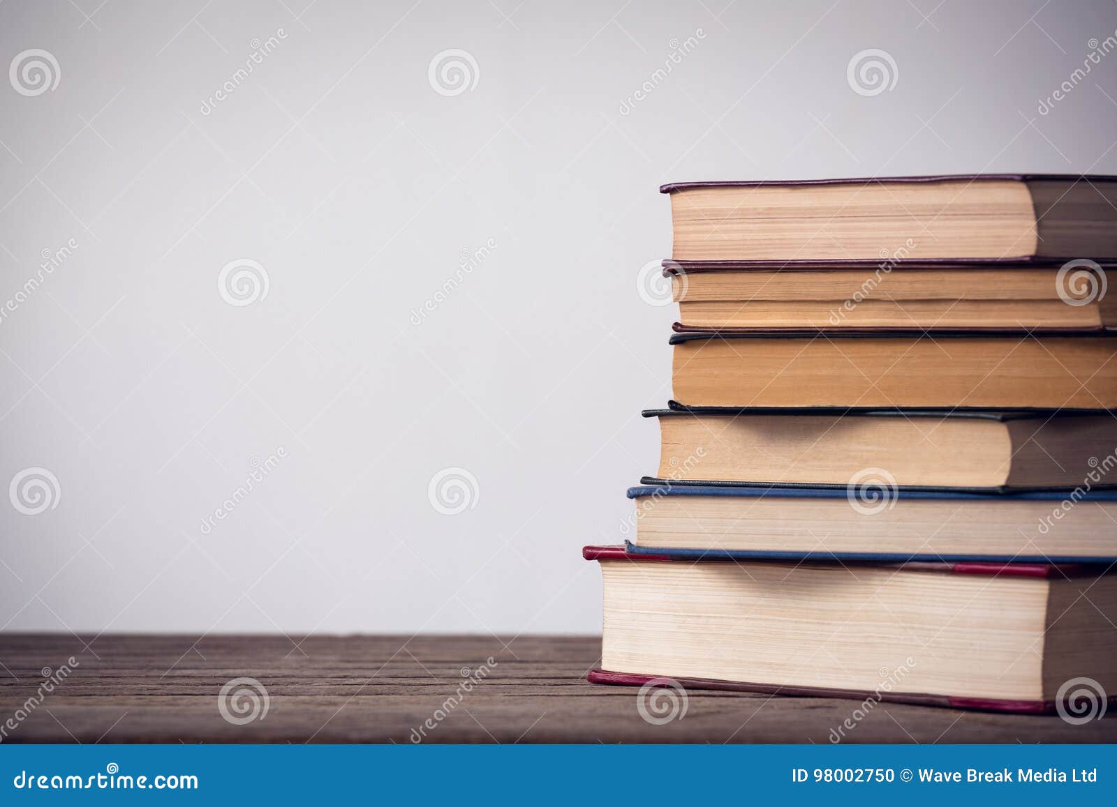 Close up of books on table stock photo. Image of collection - 98002750