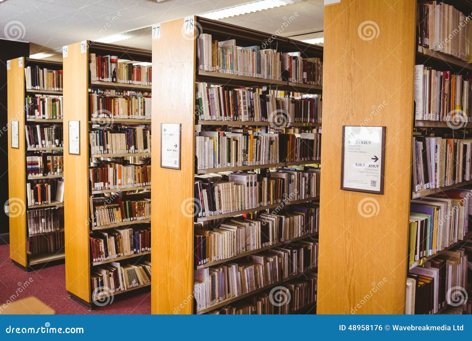 Close up of a bookshelf stock photo. Image of higher - 48958176