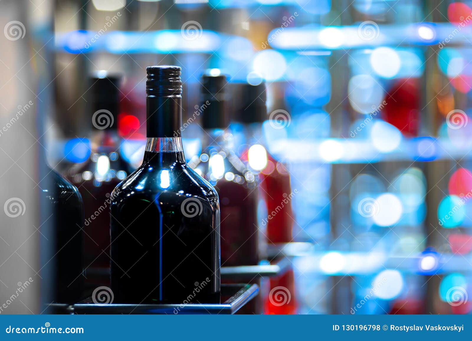 Close Up Bottles of Alcohol Stock Photo - Image of drink, colour: 130196798